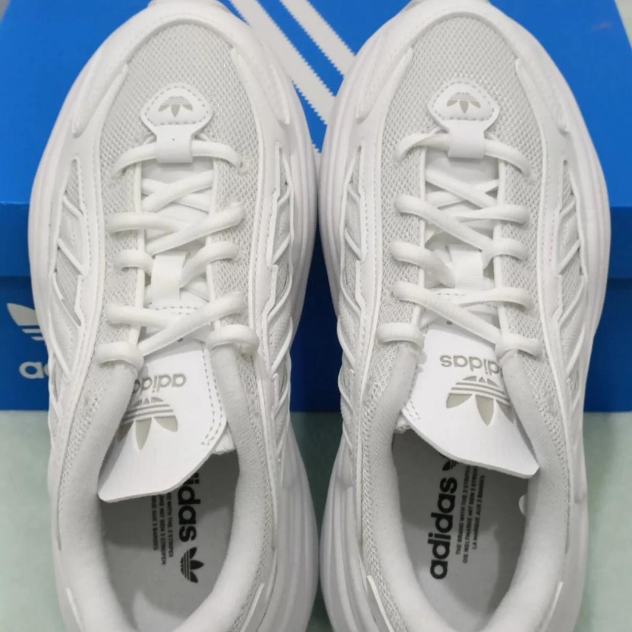 The body color scheme is white, simple and... - Depop