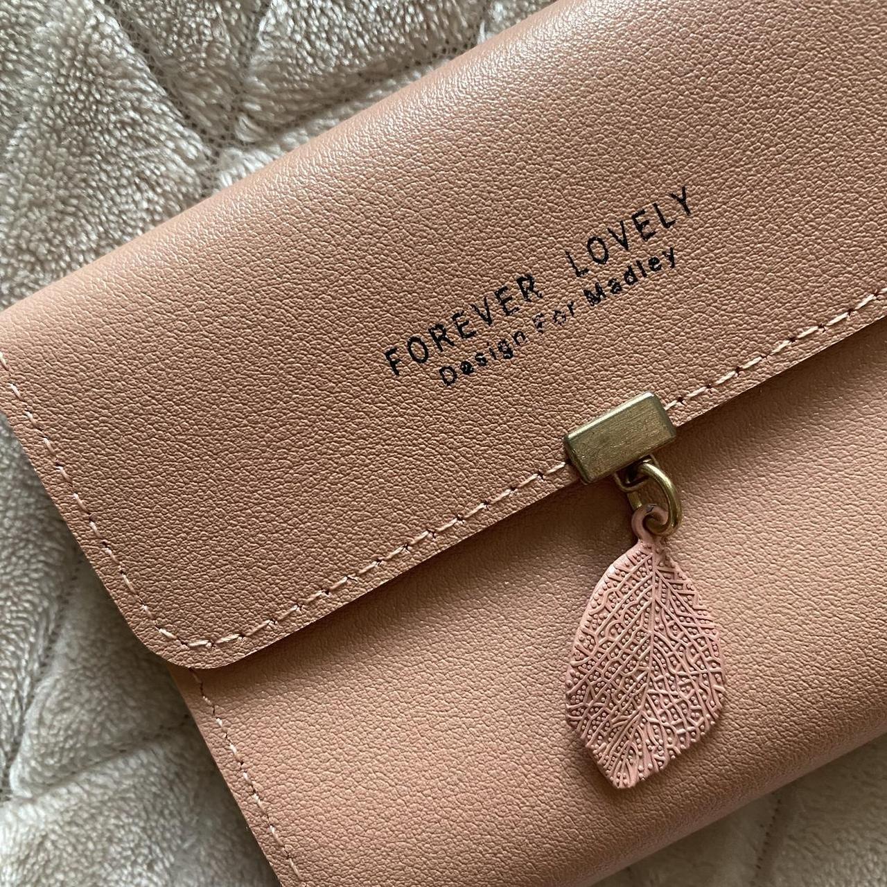 Rose pink wallet with leaf charm. This wallet holds... - Depop