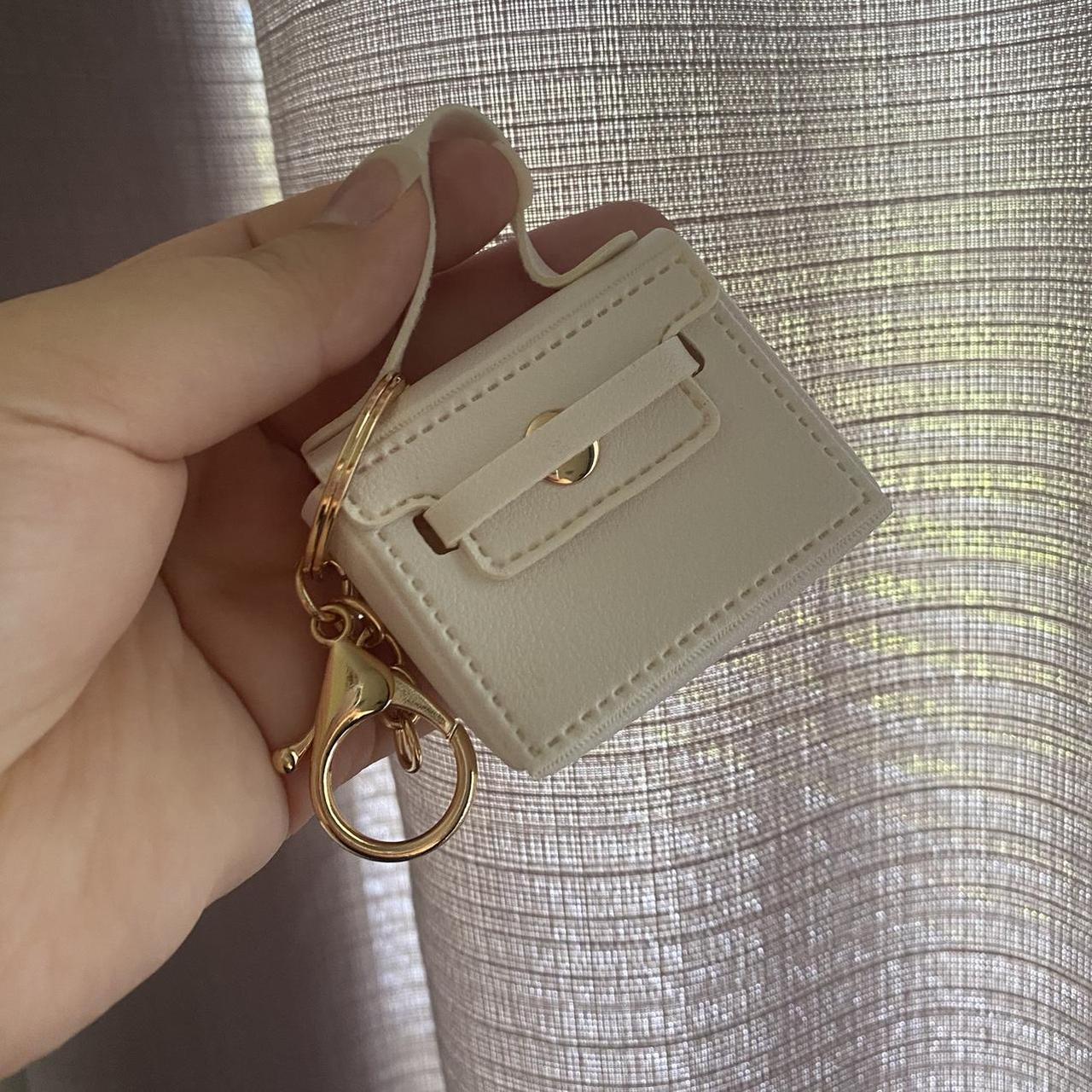Mini wallet keychain in cream & gold detailing.... - Depop