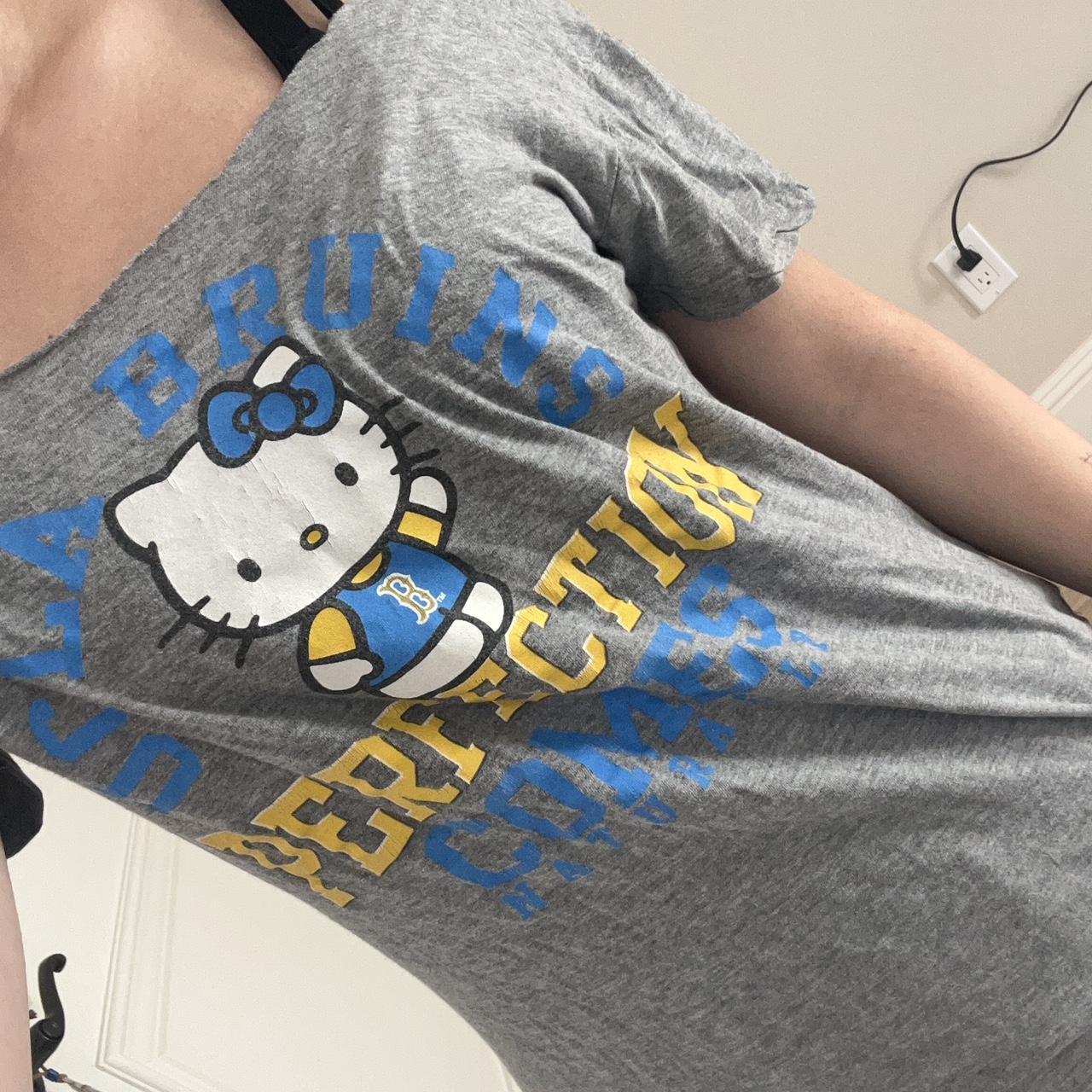 ucla off shoulder hello kitty shirt rlly cute fits a... | Depop