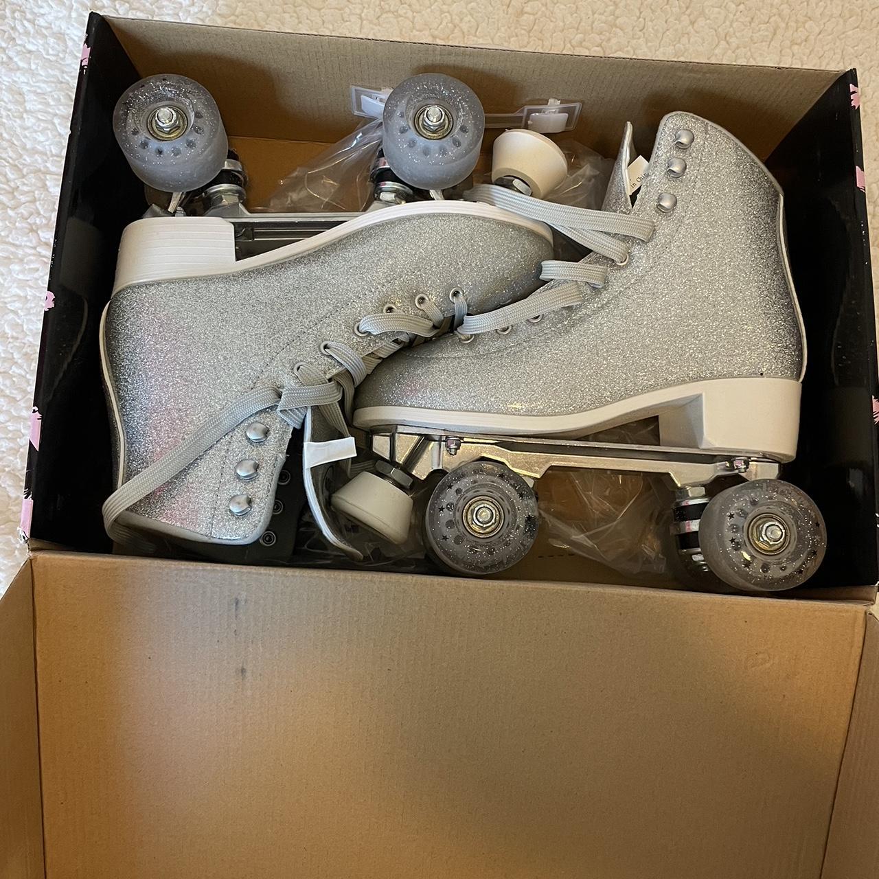 These silver roller skates have been worn once and... - Depop