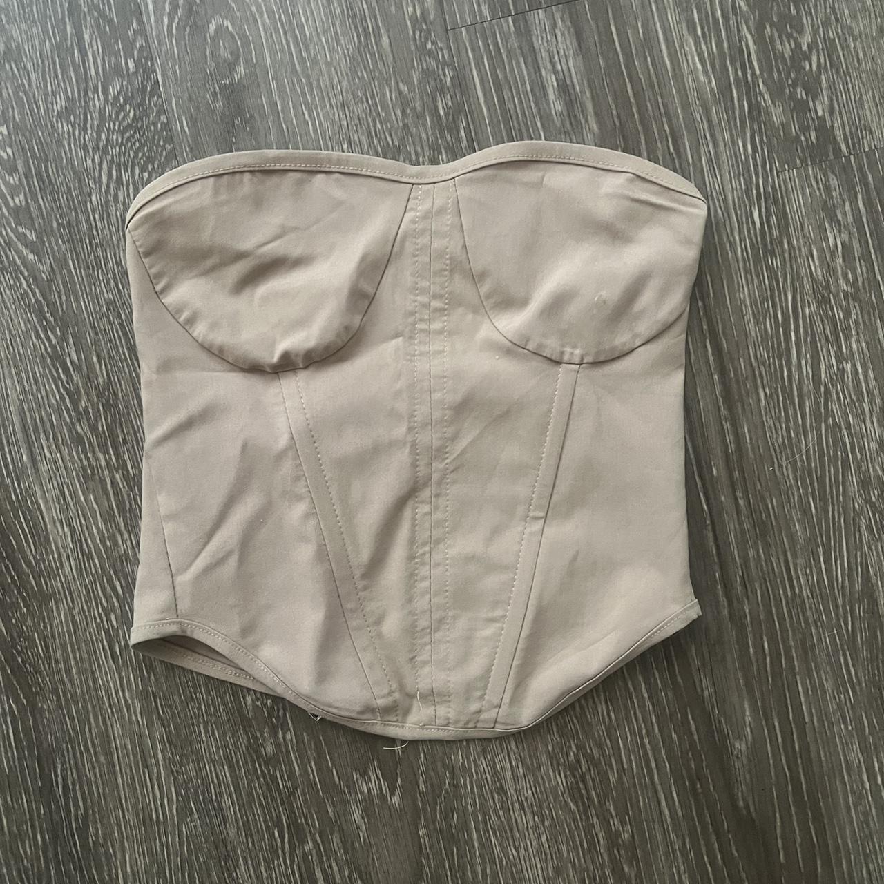 Cute little beige corset top from pretty little... | Depop