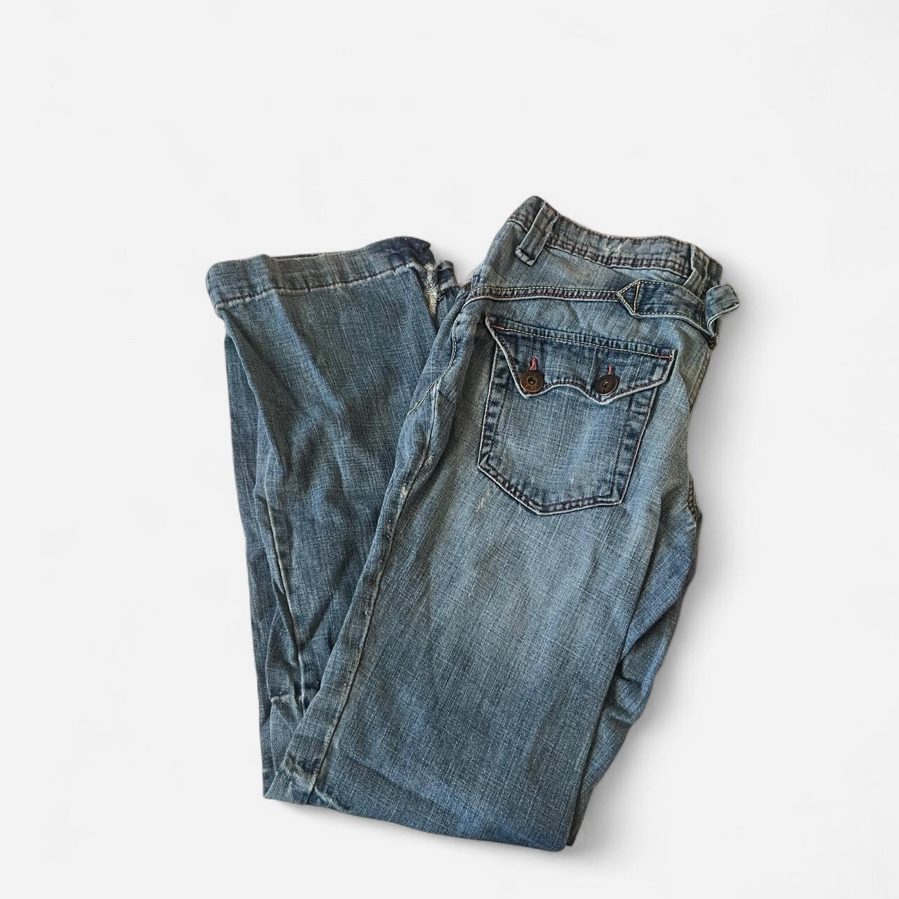 Low-rise, straight-leg blue jeans with a distressed... | Depop