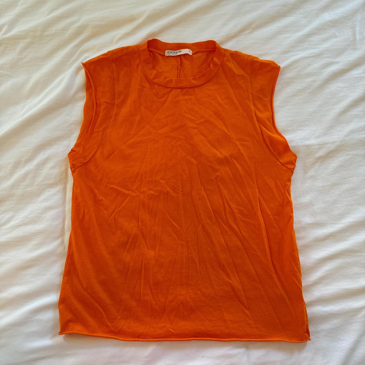 Orange sleeveless top - very stretchy and... | Depop