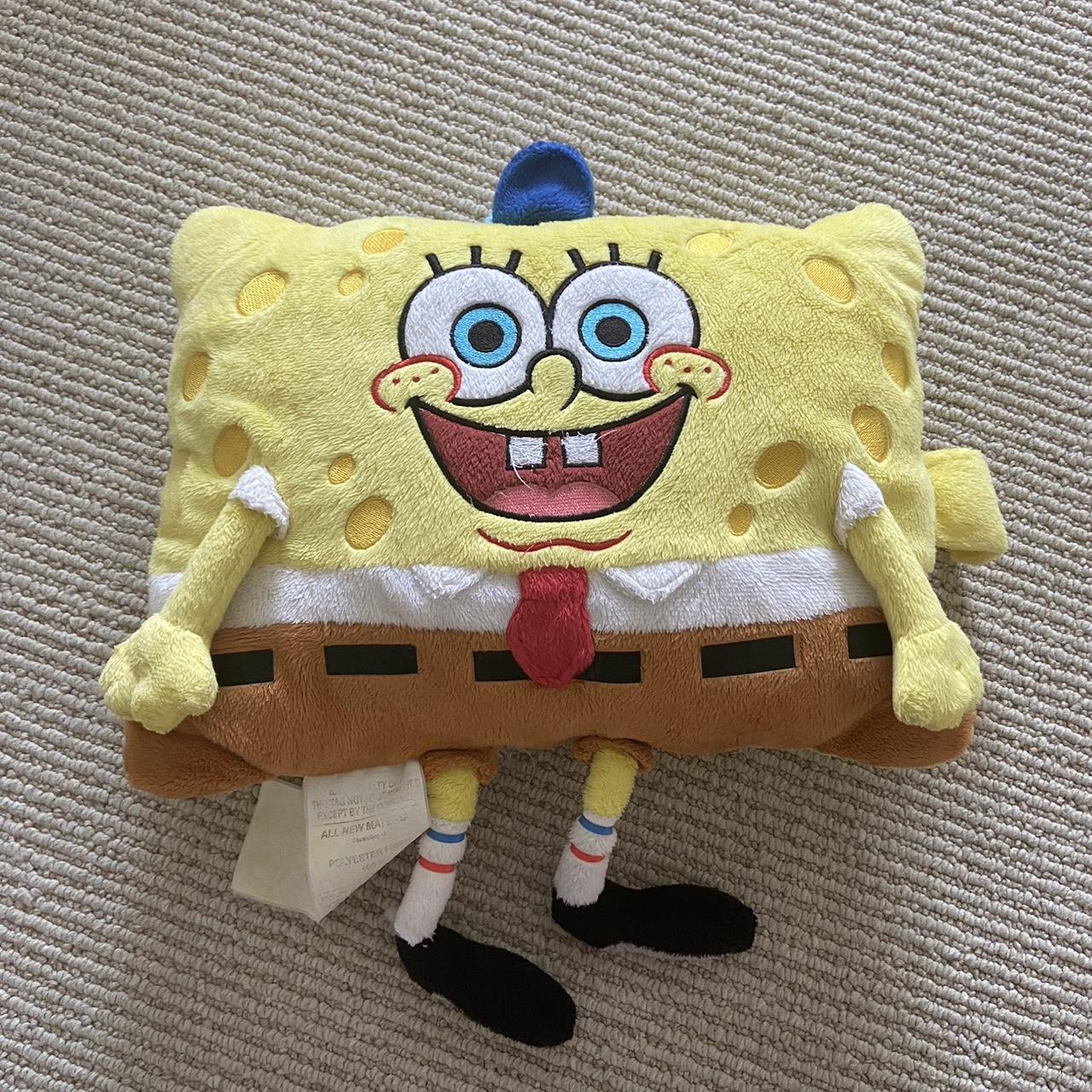 spongebob stuffed pillow some of the string on the... - Depop