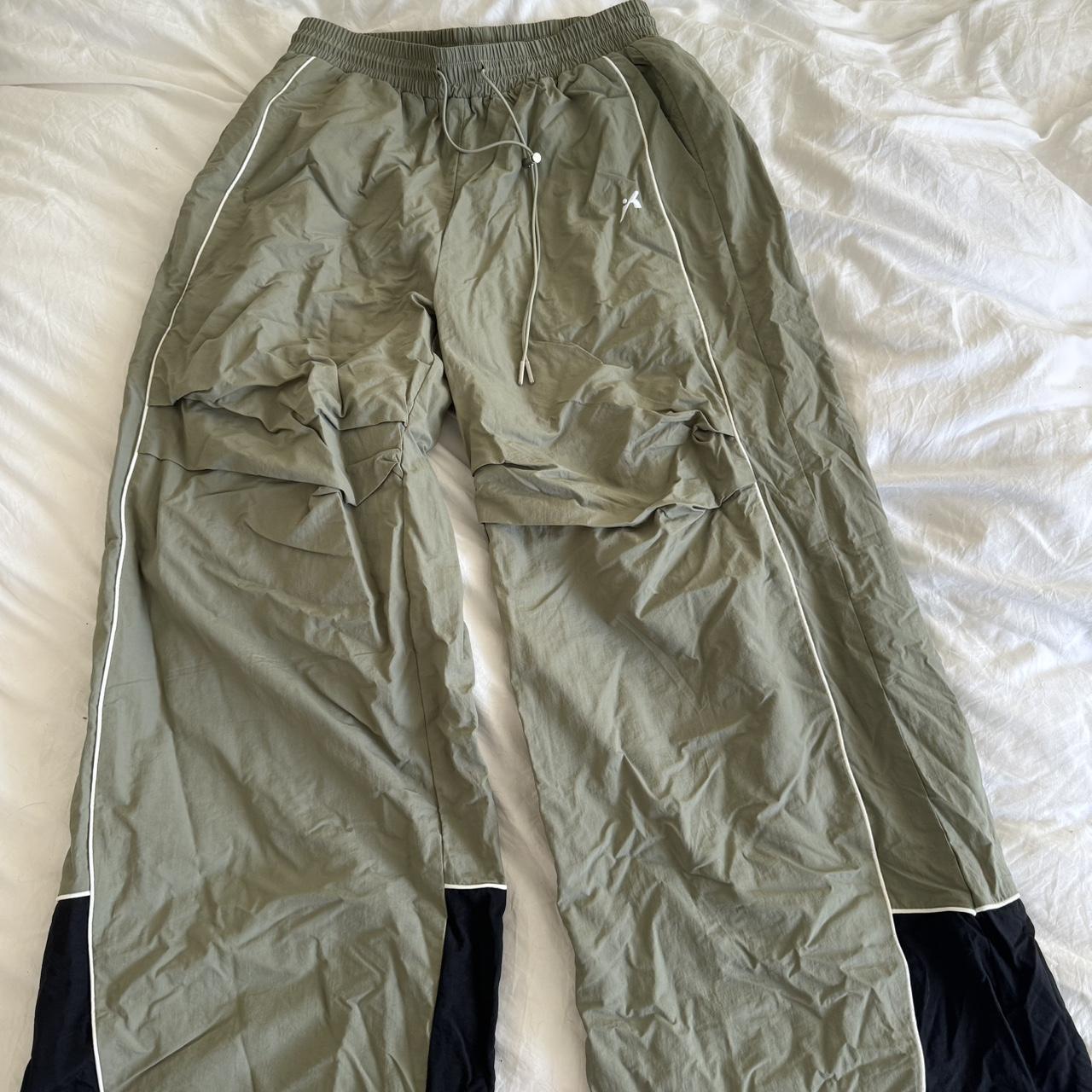 brand new KRIPT nylon track pants super cute tight... - Depop