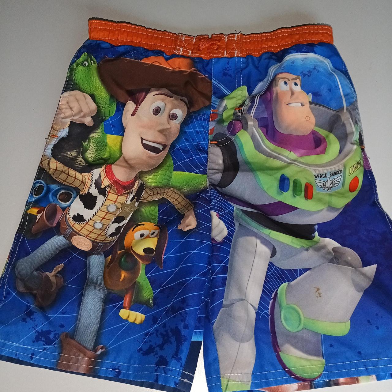 Orange and blue Toy Story swim trunks #ToyStory... | Depop