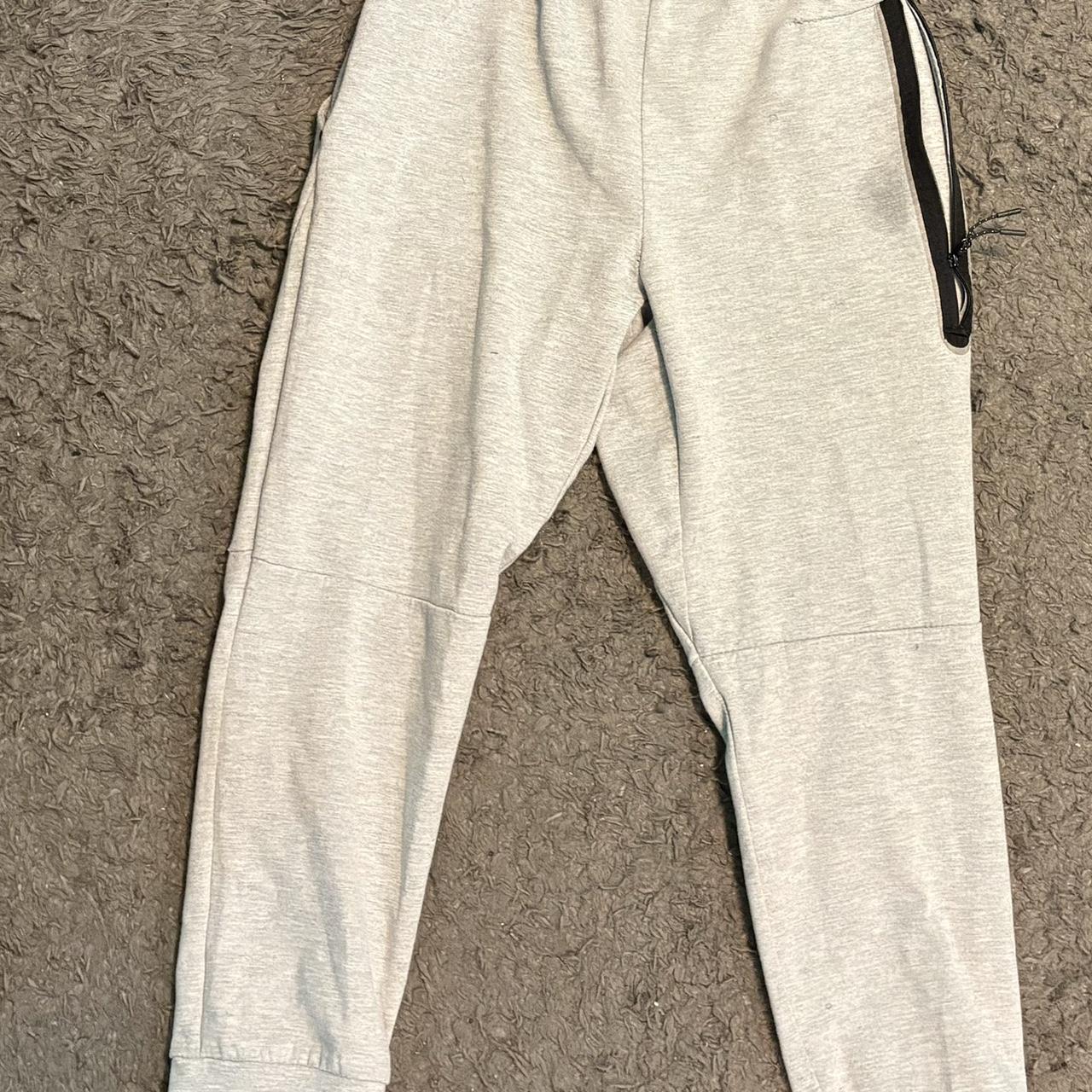 Grey tech Sweats Size small All flows shown in... - Depop