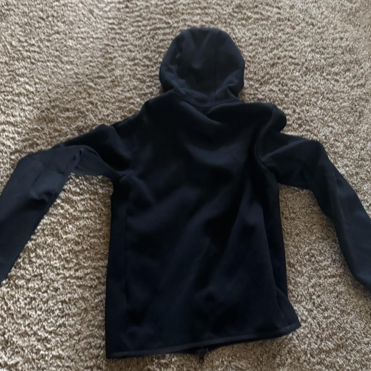 Black Nike Tech Fleece hoodie; zippers work... | Depop