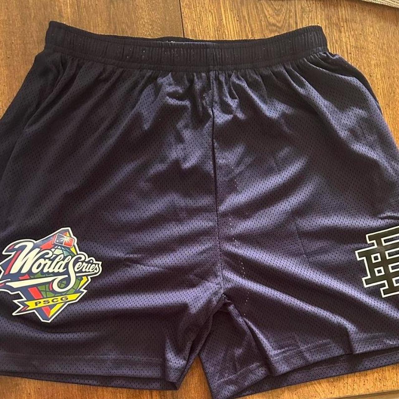 Eric, Emmanuel black World Series shorts - Depop