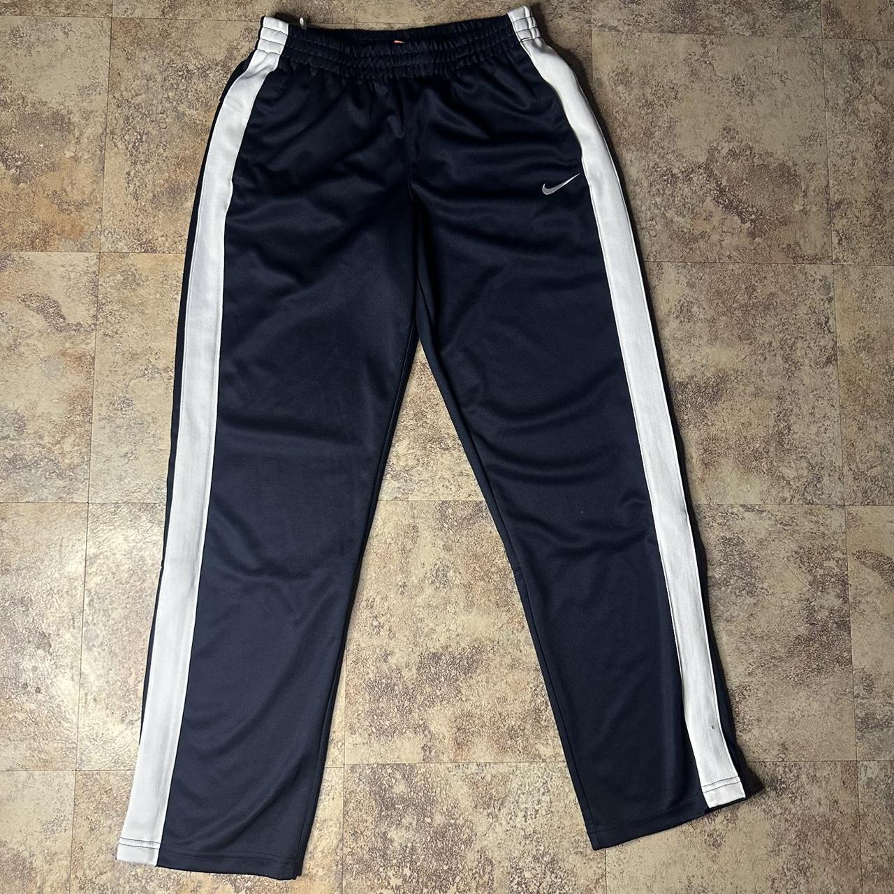 Navy blue Nike sweatpants with white stripes, old... | Depop