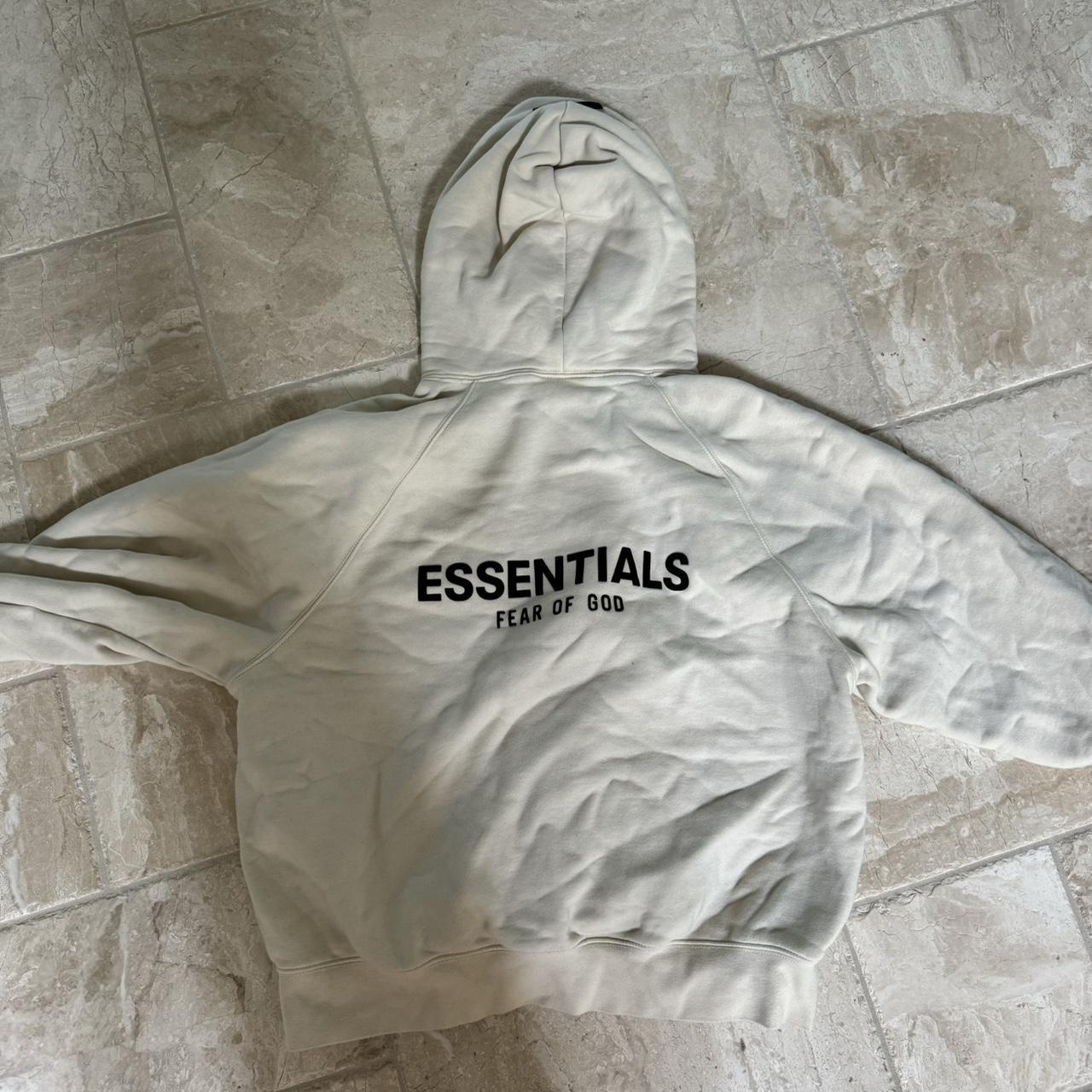 cream essentials hoodie - Depop