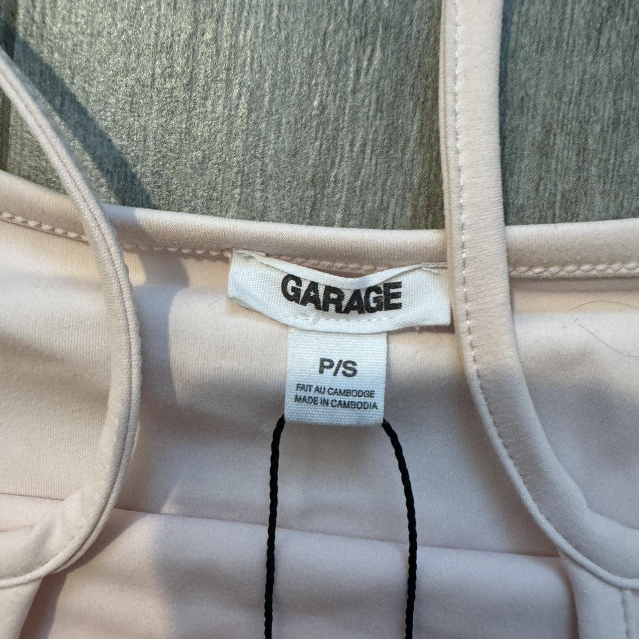 Garage light pink tank Never worn but tag is... - Depop