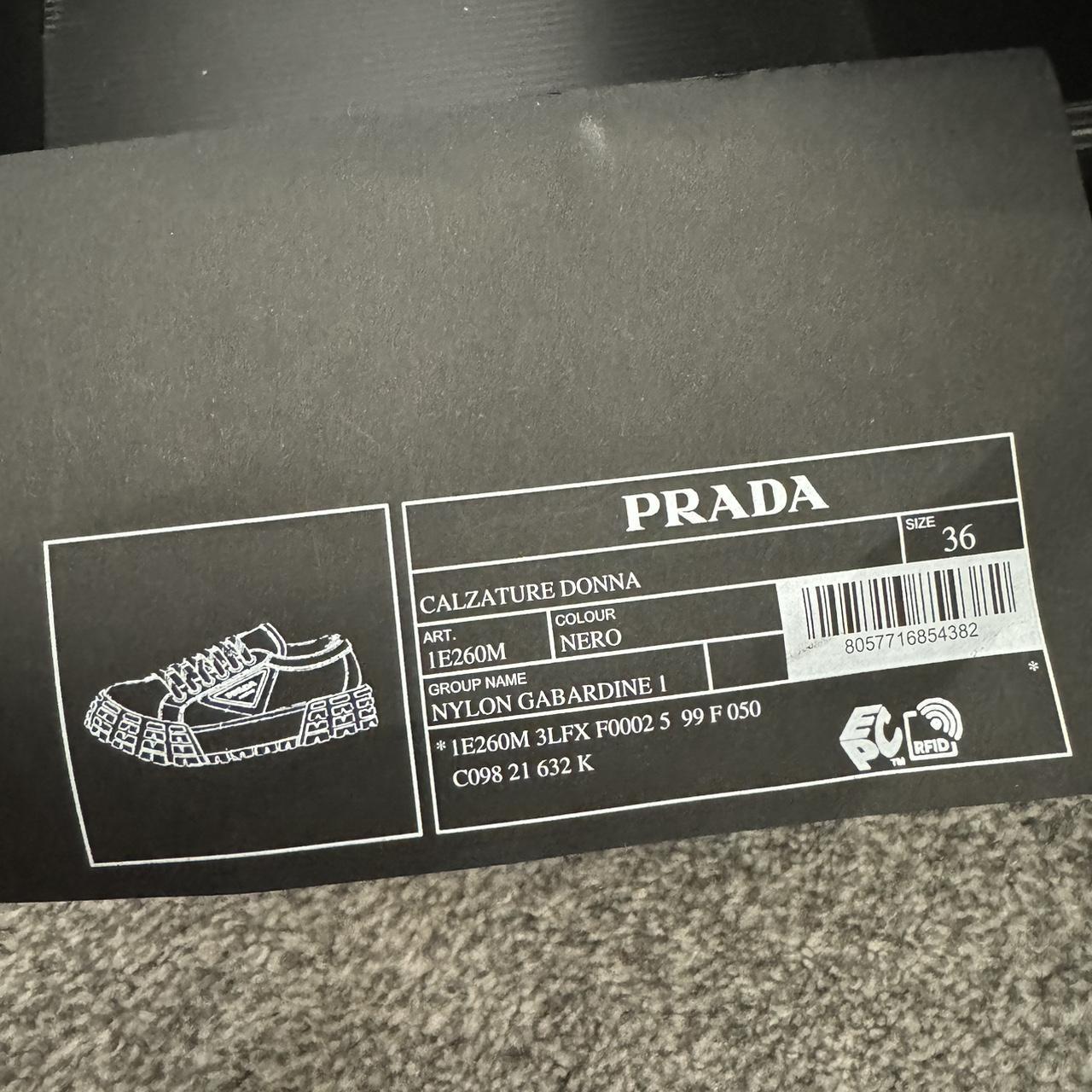 Prada all Black Double Wheel Re-Nylon Size 3 Dust... - Depop