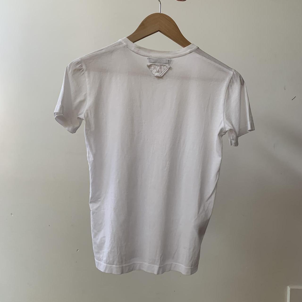 Prada baby tee. With triangle logo on the back. Size... - Depop