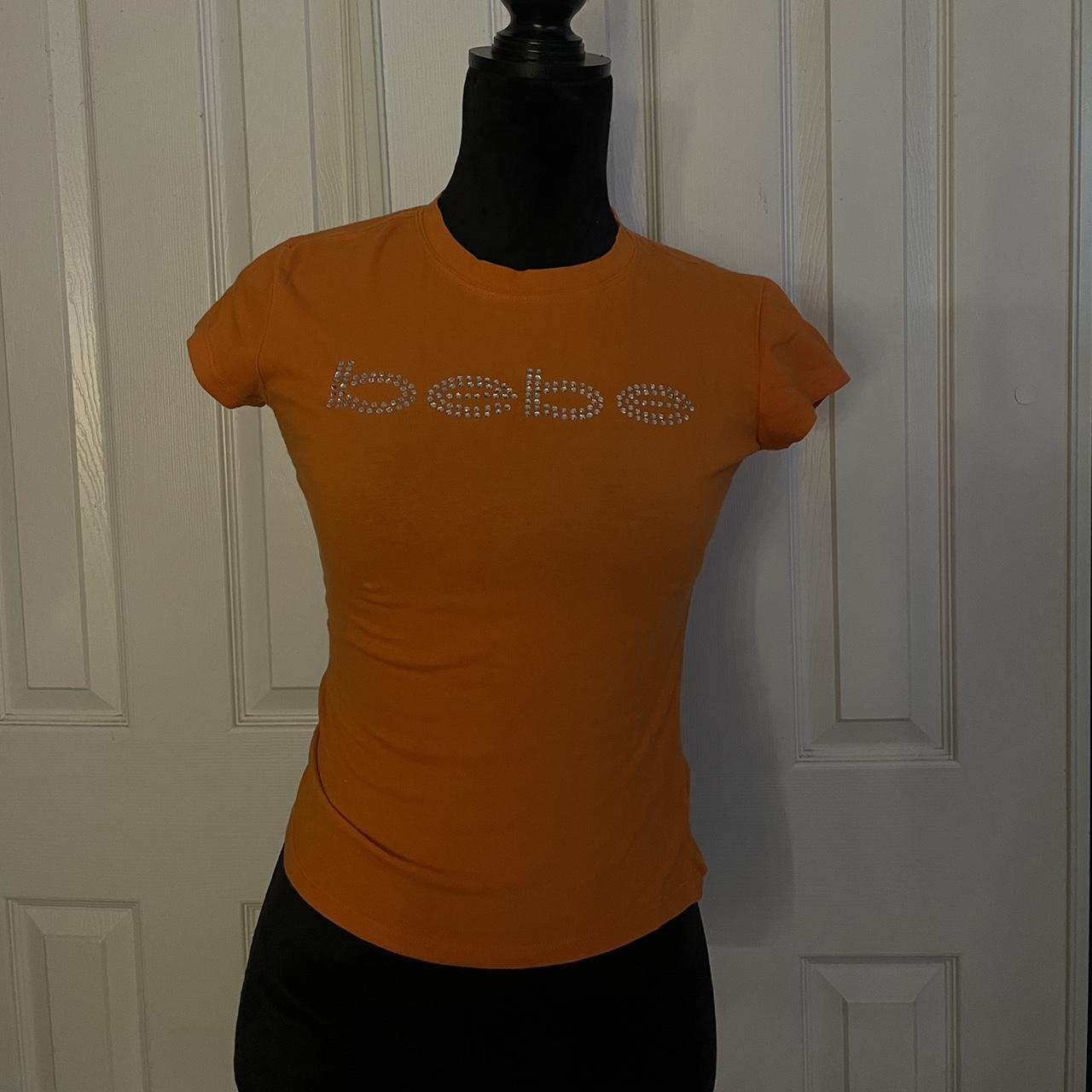 orange rhinestone bebe tee size medium - Depop