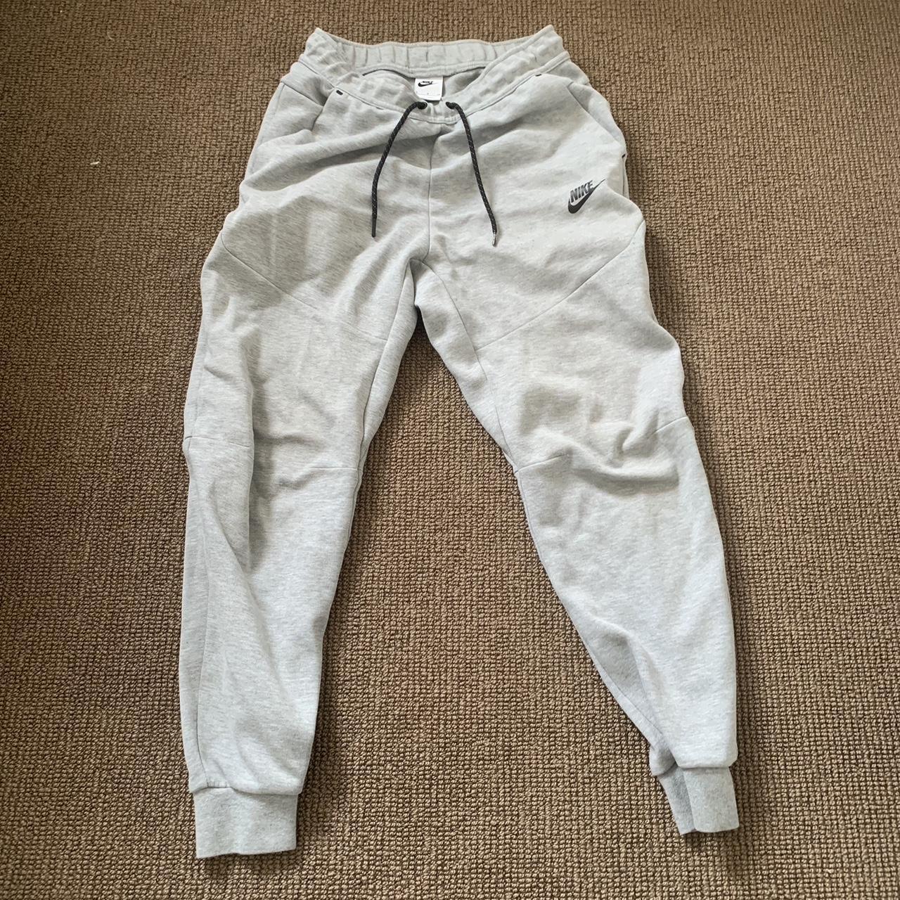 Grey Nike tech fleece pants Last seasons Size S - Depop