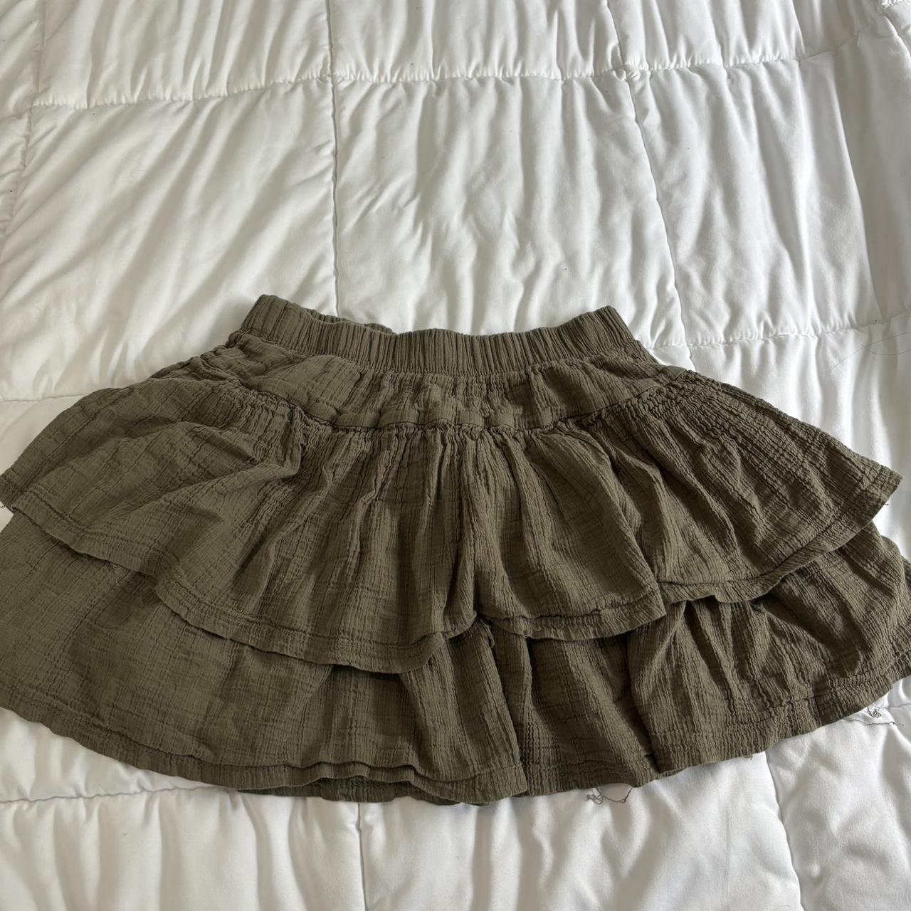 flowy short green mini skirt! there’s no tag but it... - Depop