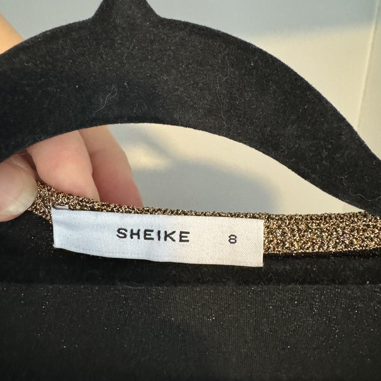 SHEIKE gold long sleeve cocktail dress Low v neck... - Depop