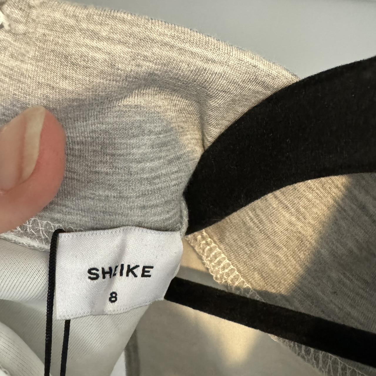 SHEIKE Brand new with tags Grey high neck... - Depop