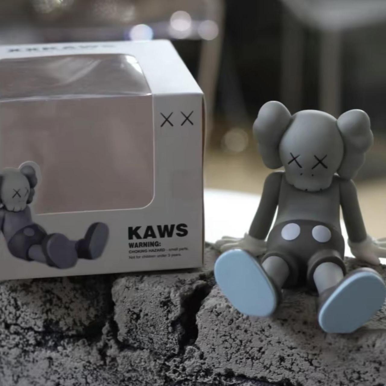 Kaws action figures black and grey Message me which... - Depop