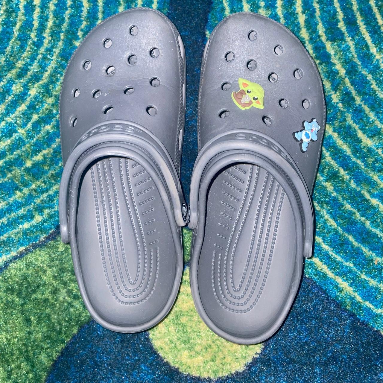 Grey Crocs #clogs with #Jibbitz charms #Crocs | Depop