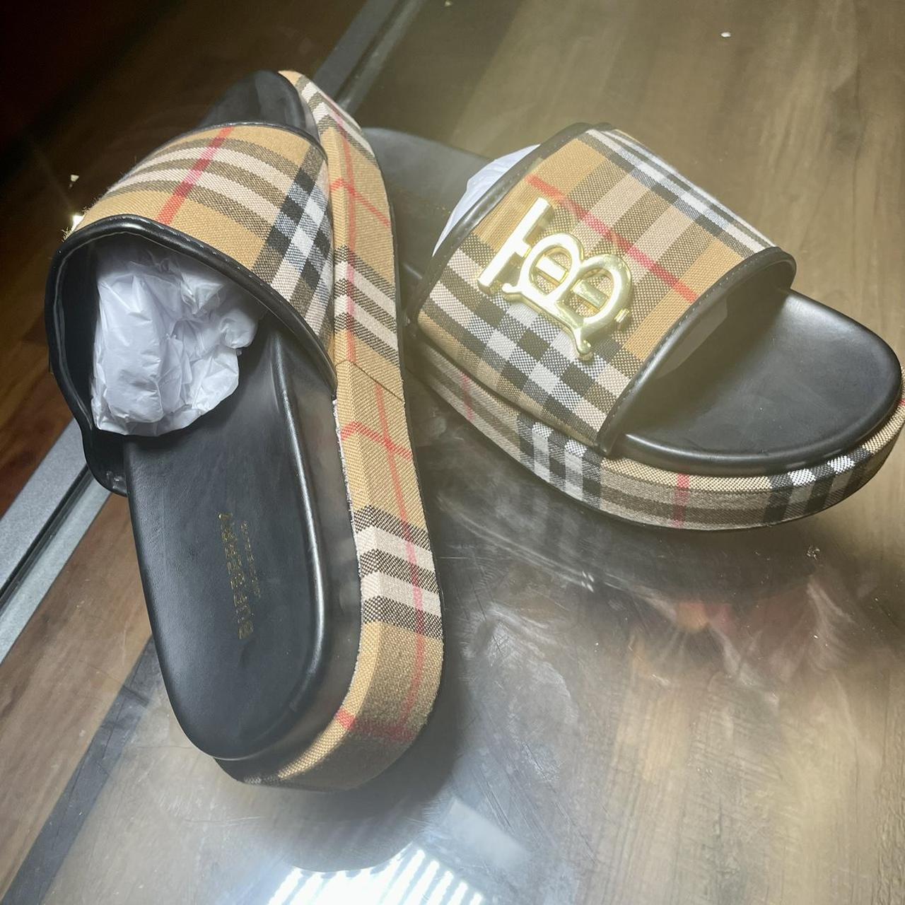 For sale: A pair of brand new Burberry slides, worn... - Depop