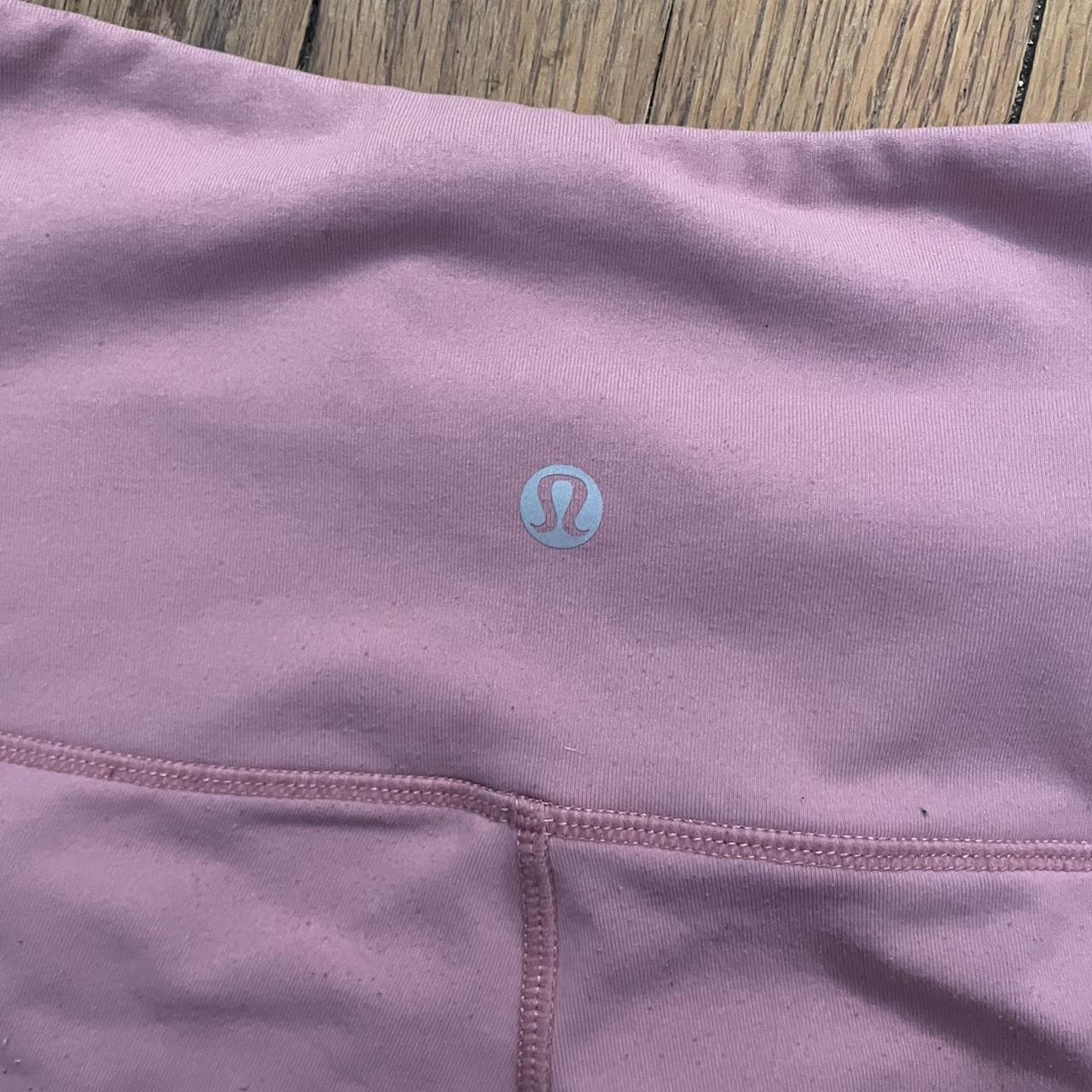 pink lululemon leggings only sign of wear is very... - Depop