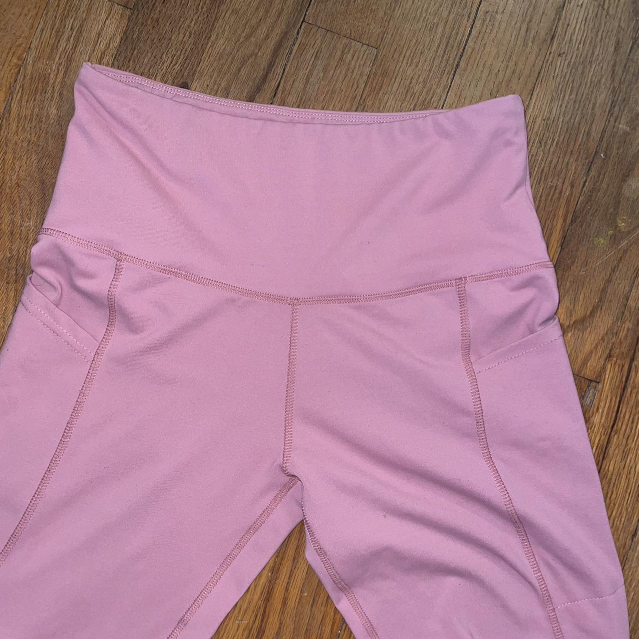 pink lululemon leggings only sign of wear is very... - Depop