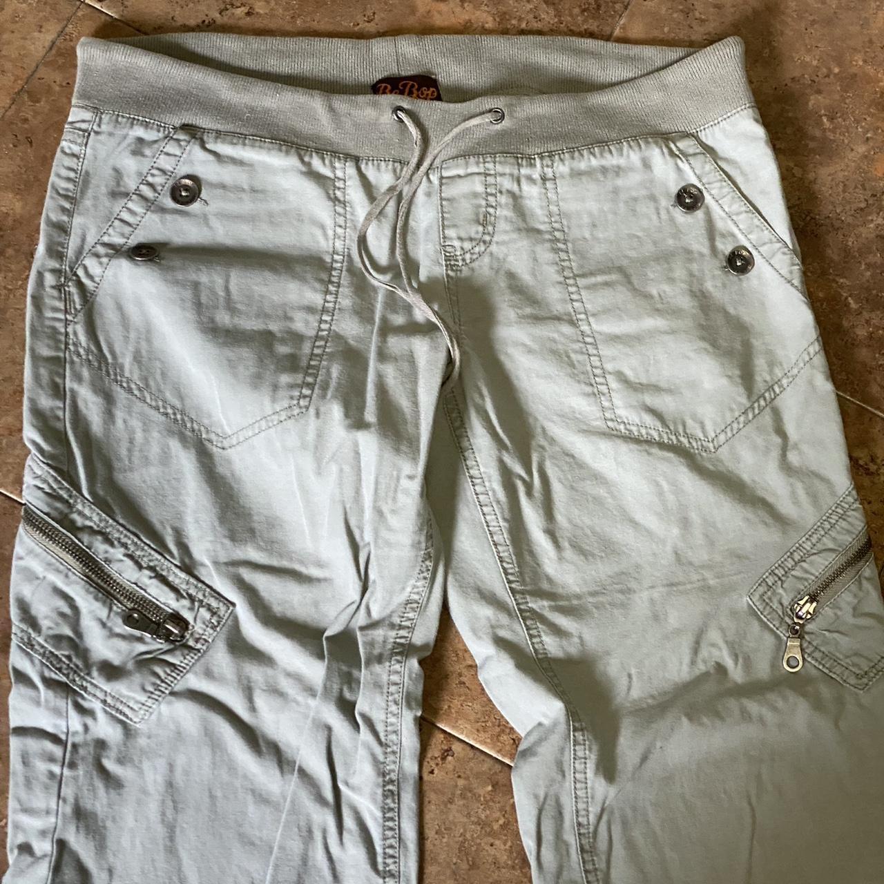 Light green cargo pants with a relaxed fit -waist... - Depop