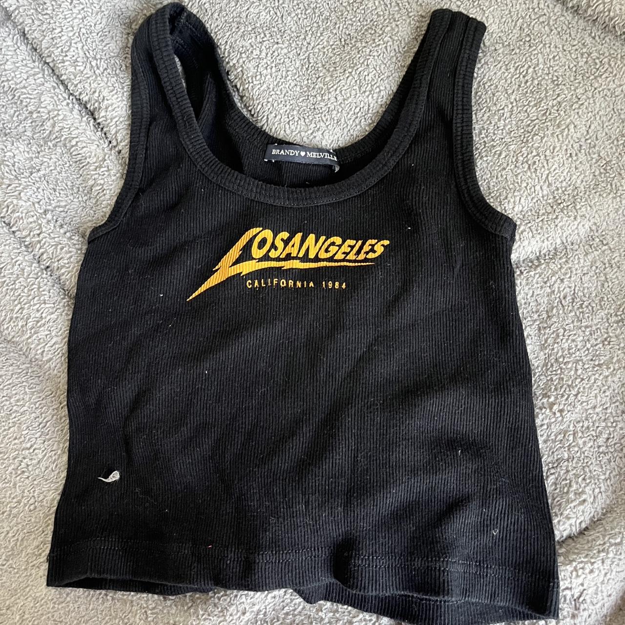 Black Brandy Melville tank top with yellow graphics... | Depop