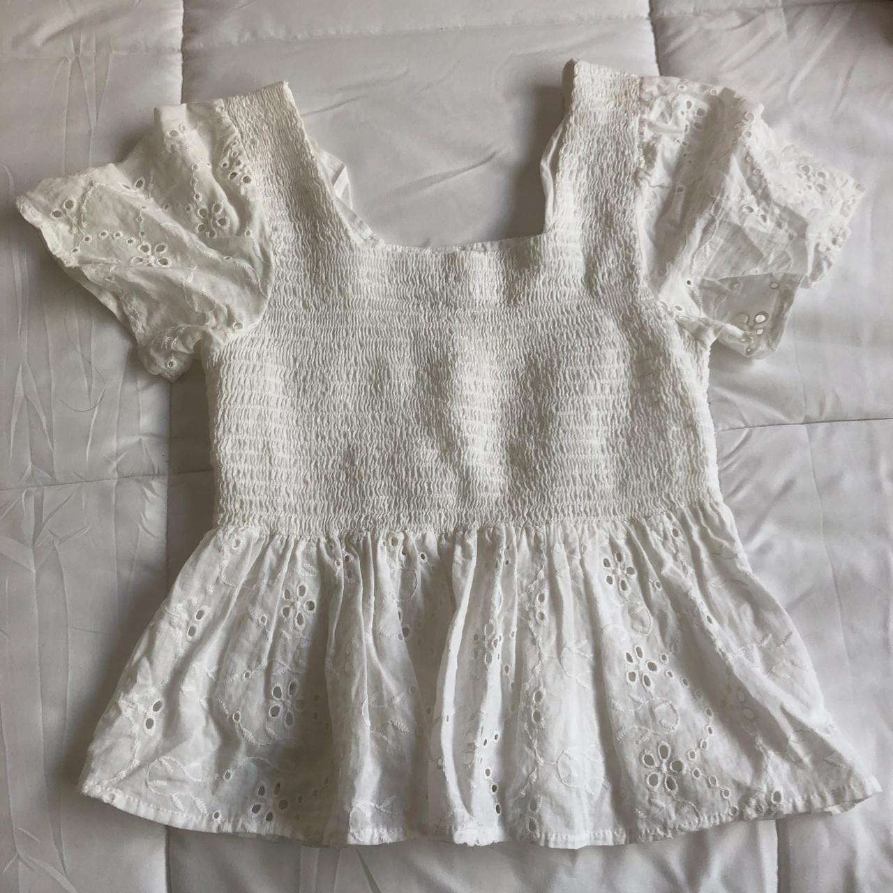 White babydoll empire waist top with a flattering... - Depop