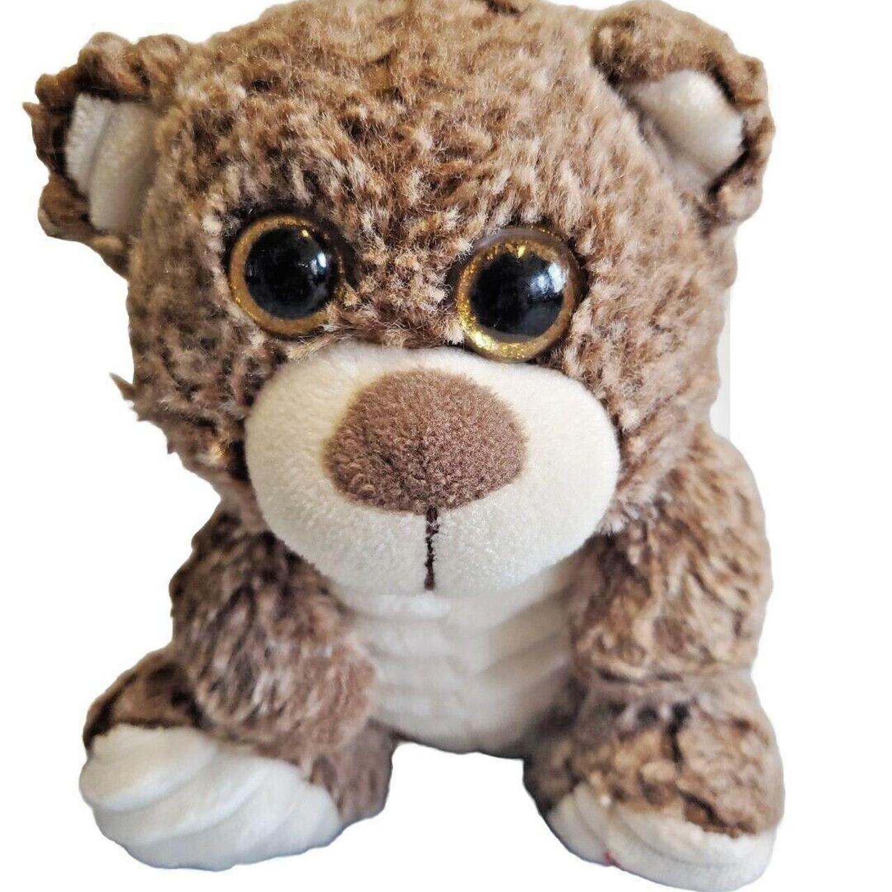 This KellyToy plushie is a charming little bear. Depop