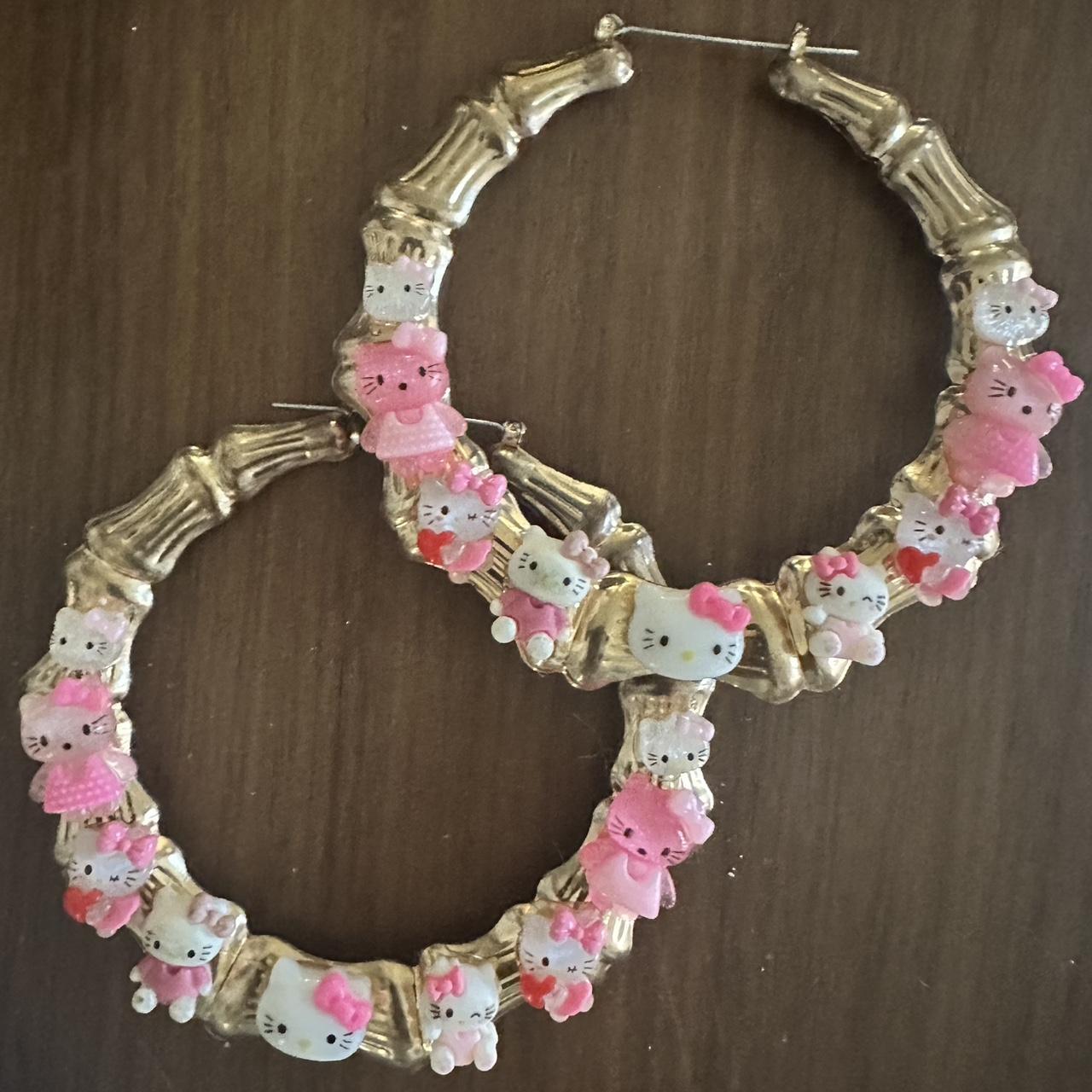 Large gold hello kitty hoops | Depop