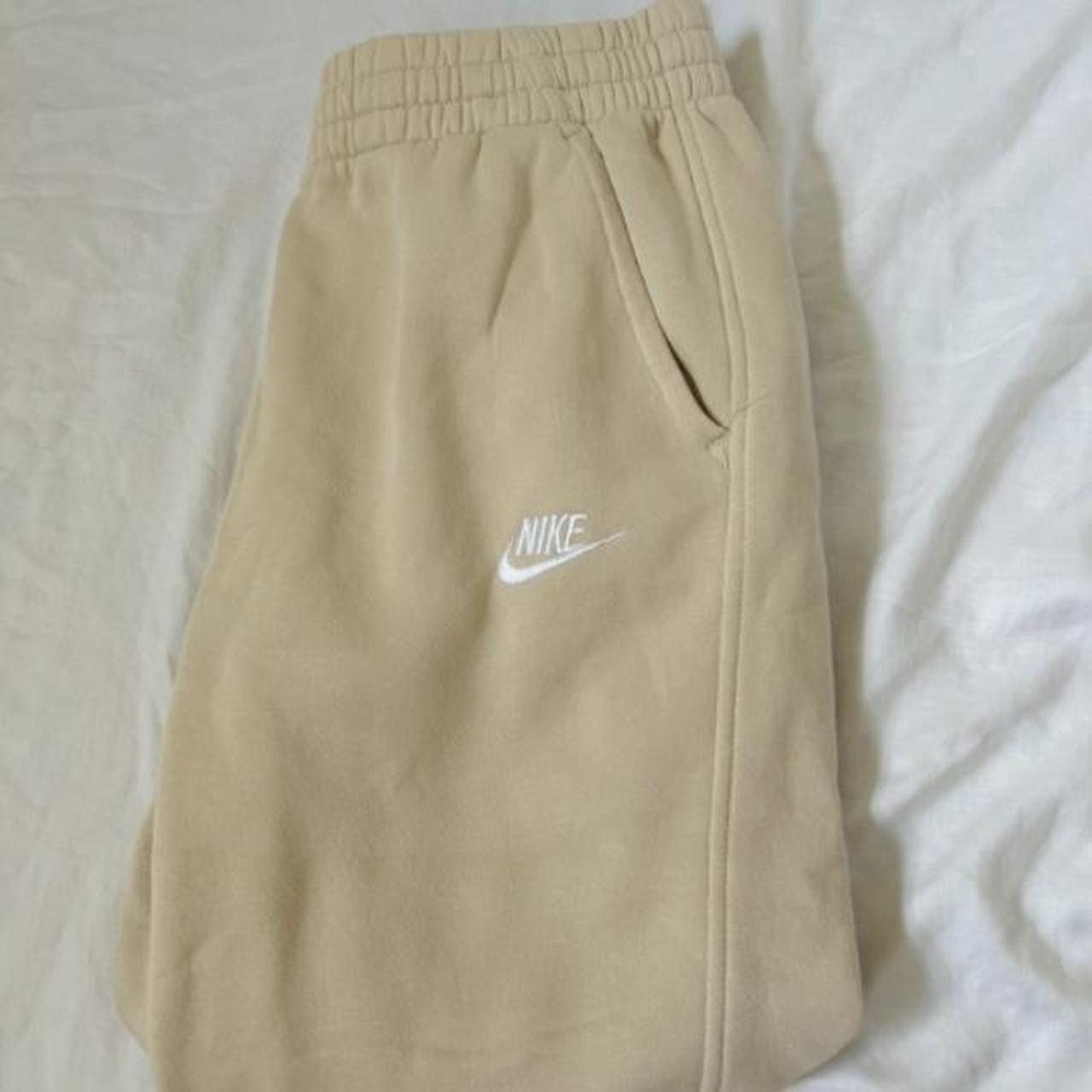 nike kids tan sweatpants! size : L - Depop