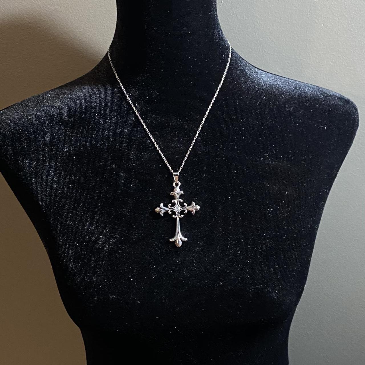 Beautiful silver cross pendant with a clear diamond... | Depop