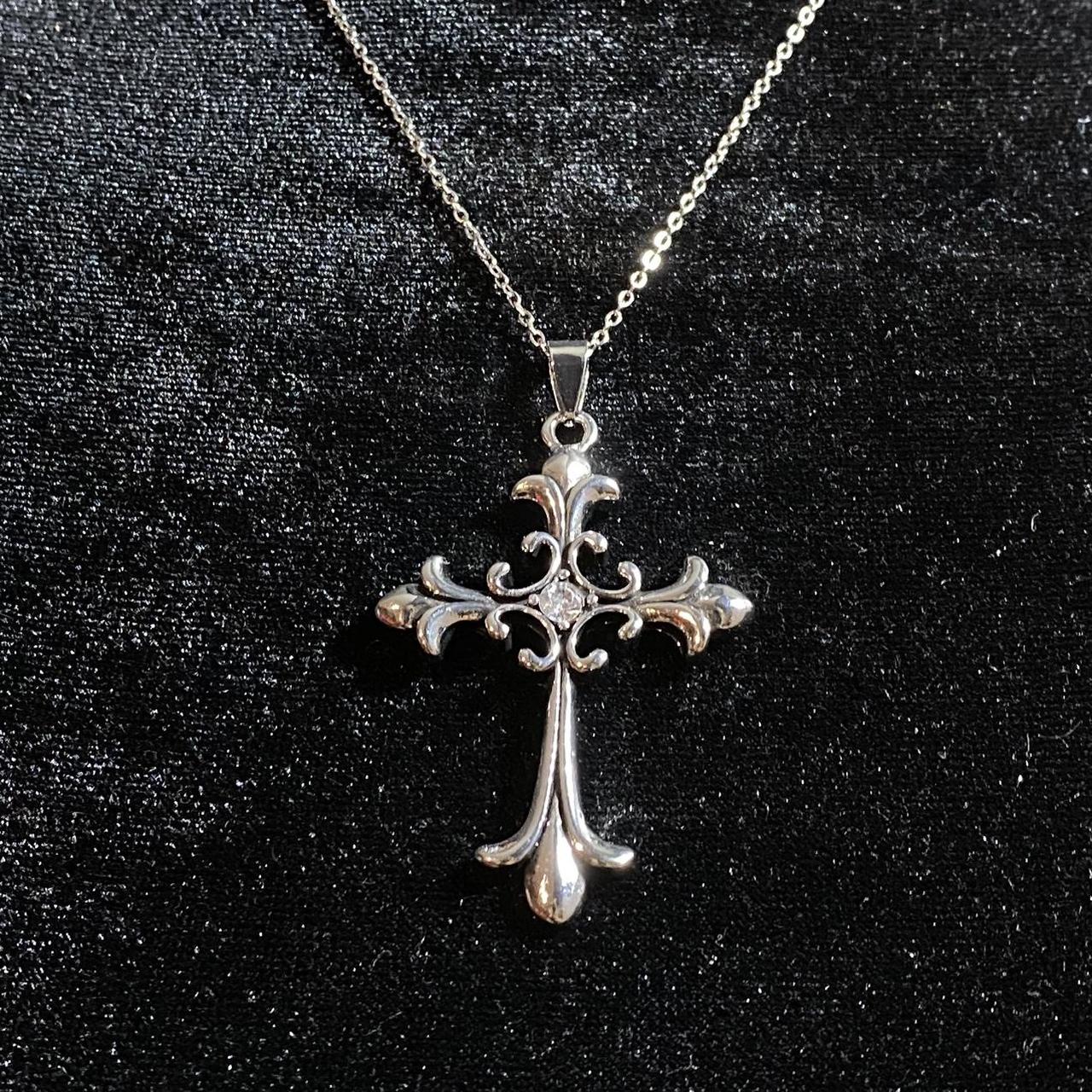 Beautiful silver cross pendant with a clear diamond... | Depop
