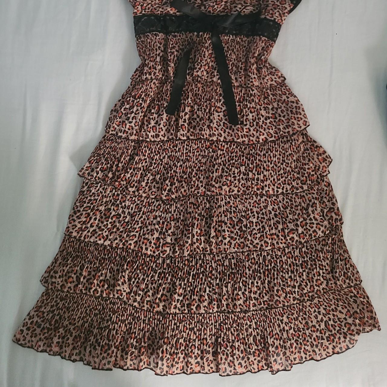 layered y2k cheeta printed ruffle dress with black... - Depop