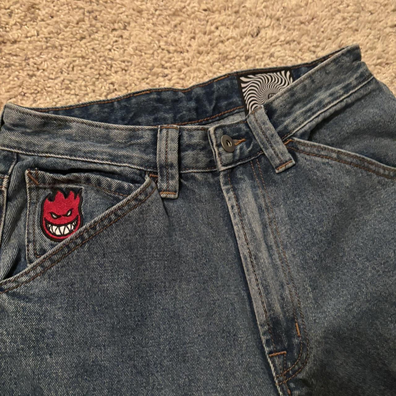 Blue Spitfire denim jeans with red accents #skater | Depop