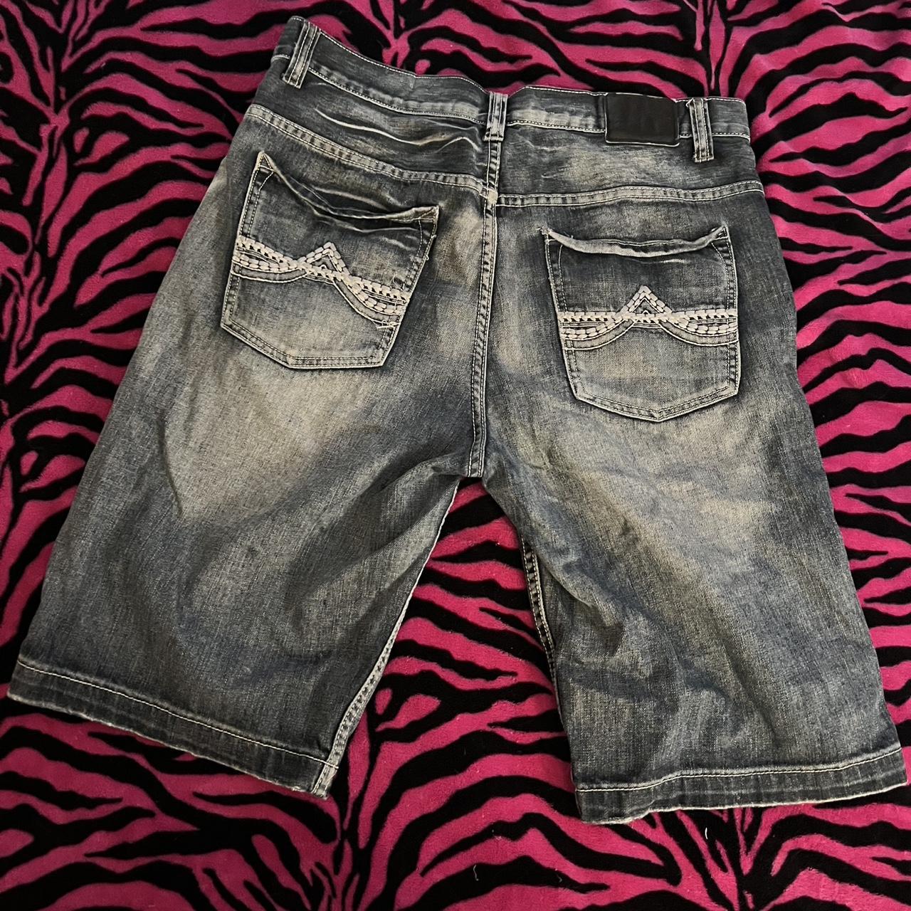 jorts with a cool wash and designs on the back pockets | Depop
