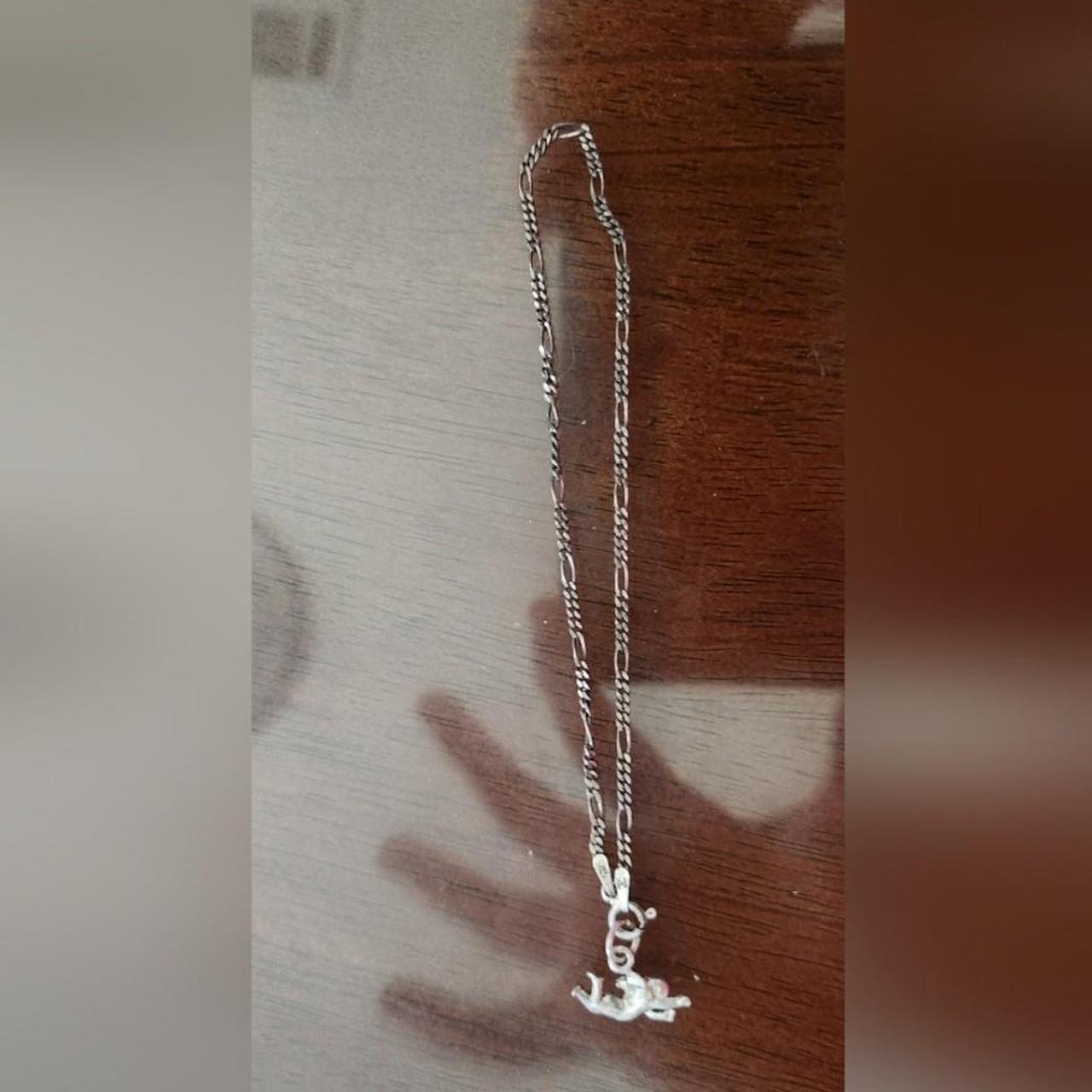 Sterling silver Figaro pattern bracelet with charob... - Depop