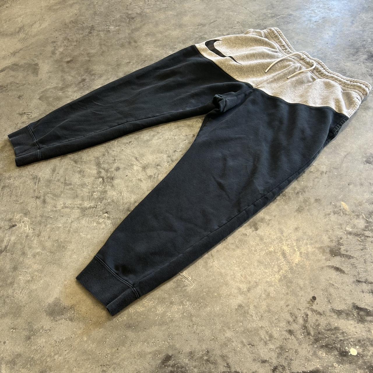 Grey and black Nike tech sweatpants with drawstring... | Depop