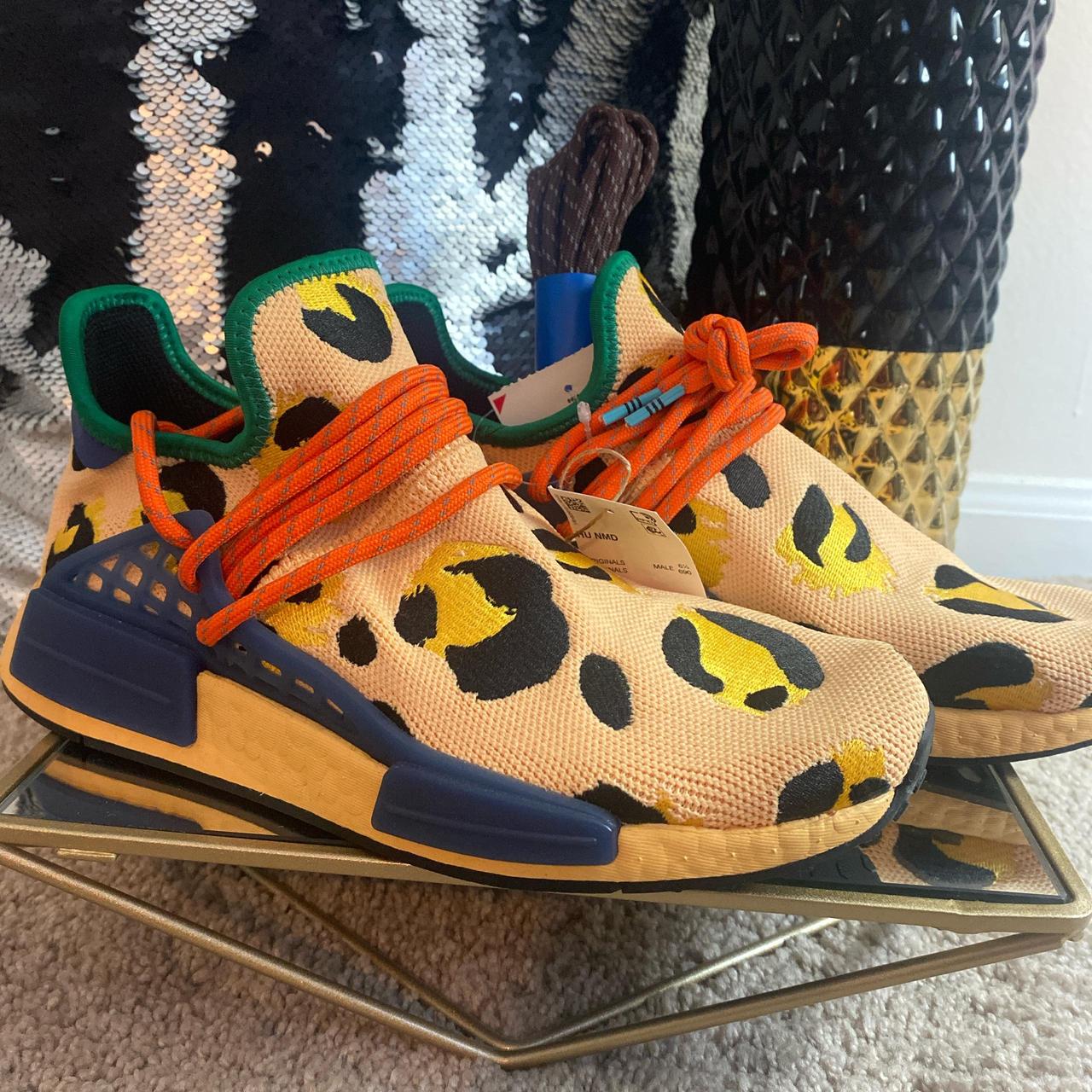 Yellow and blue Adidas Pharrell Human Race trainers... | Depop