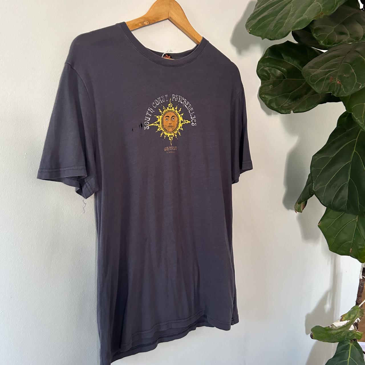 Ghanda T-Shirt - Hole on front - $10 - Size... - Depop