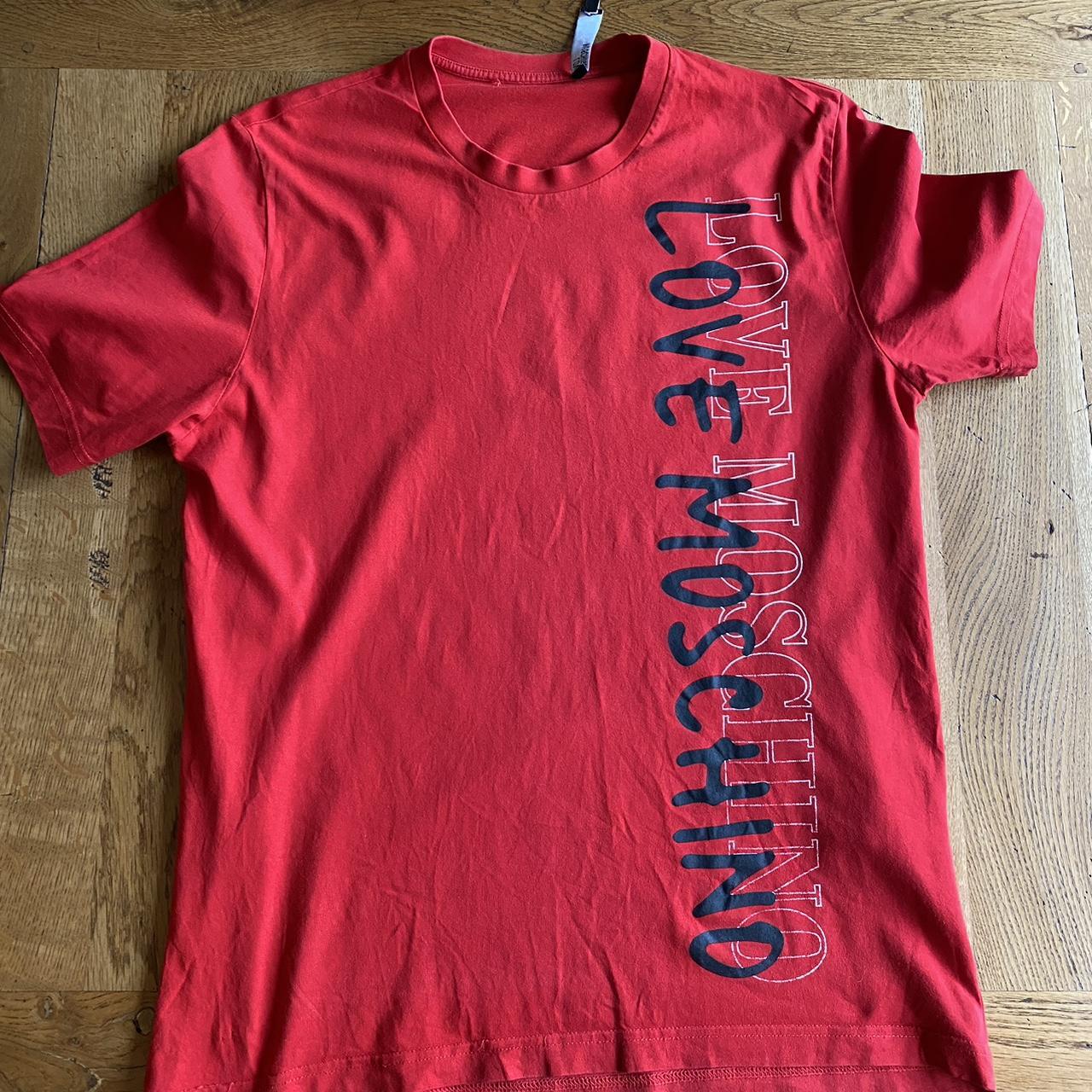 Red Moschino T-shirt Label says XL fits more like a... - Depop