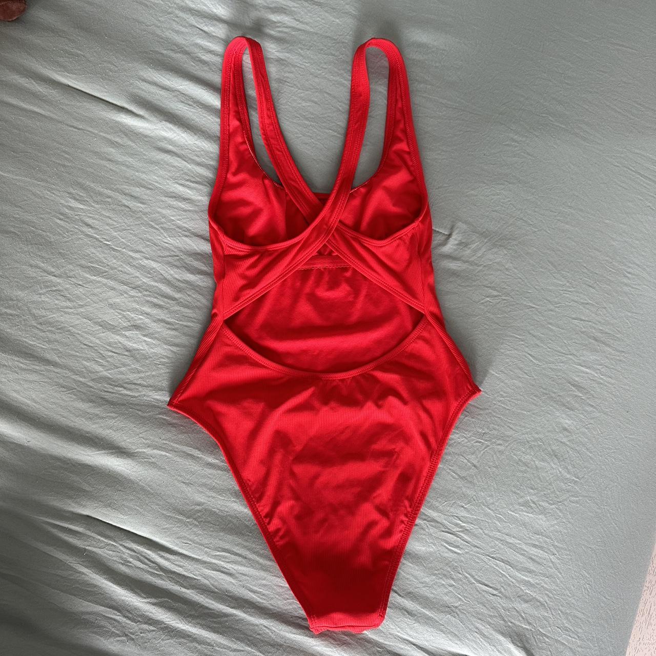 Red target one piece swimsuit Only worn once,... - Depop