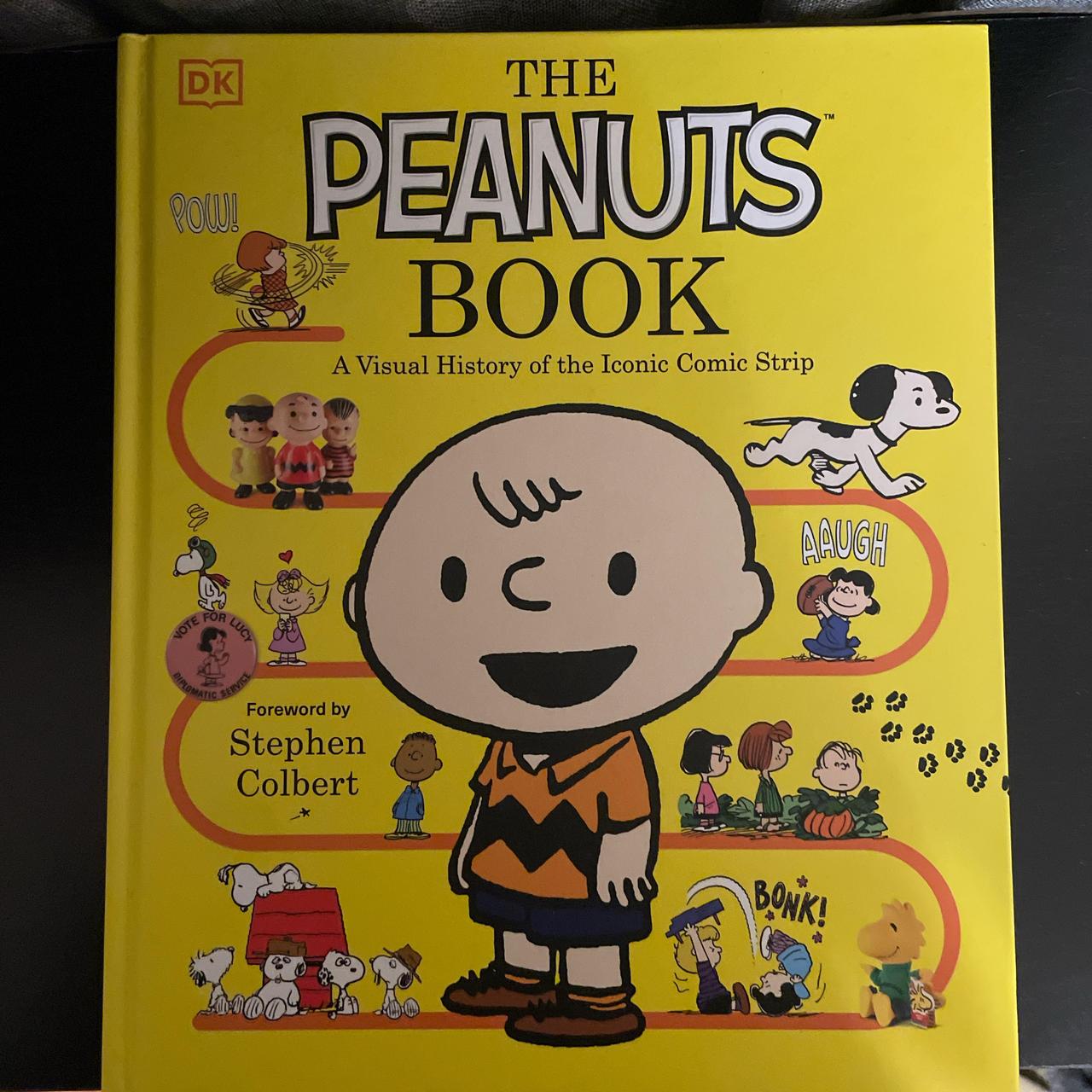 The Peanuts Book: A Visual History of the Iconic... - Depop