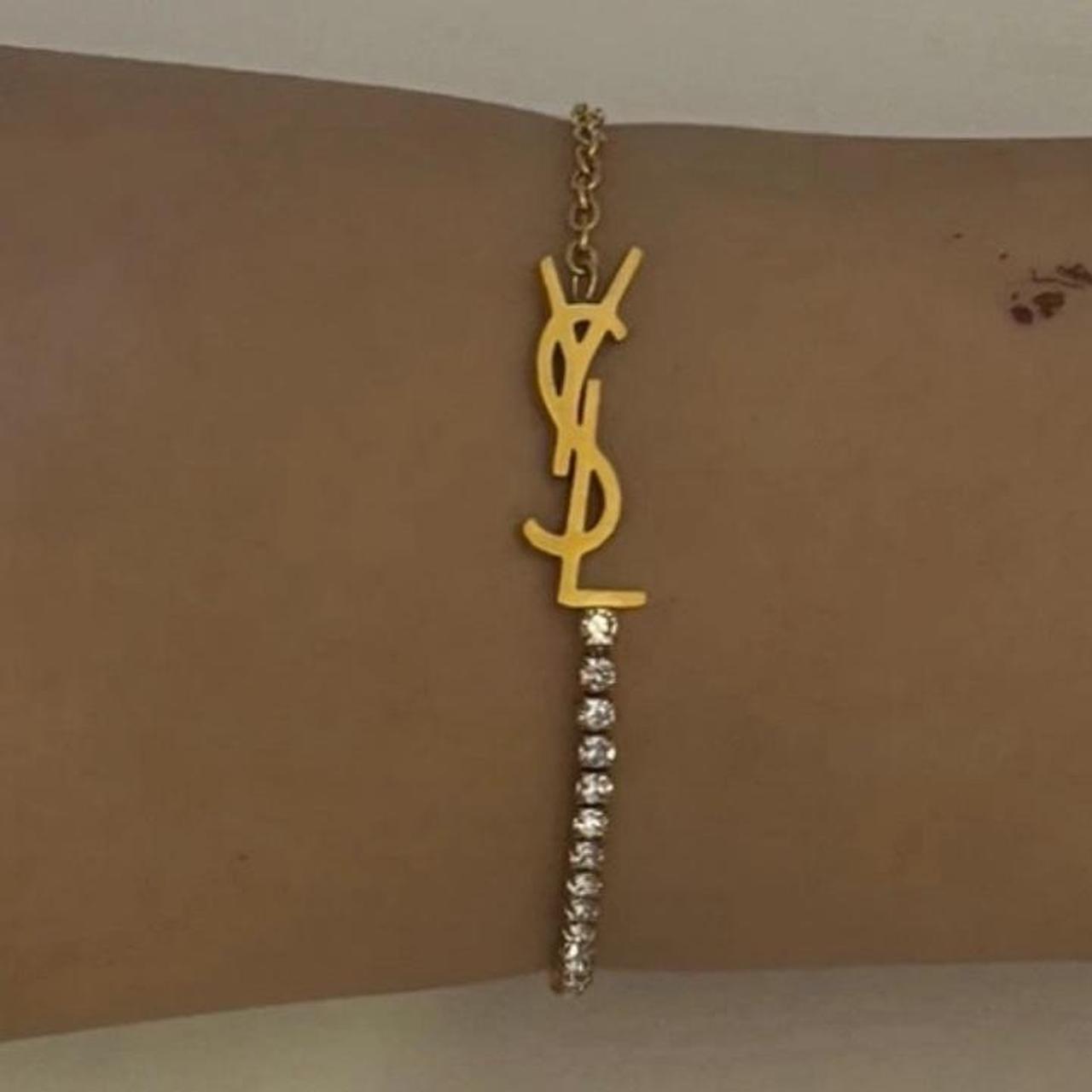 NOT AVAILABLE UNTIL MAY 1ST Gold YSL monogram... | Depop