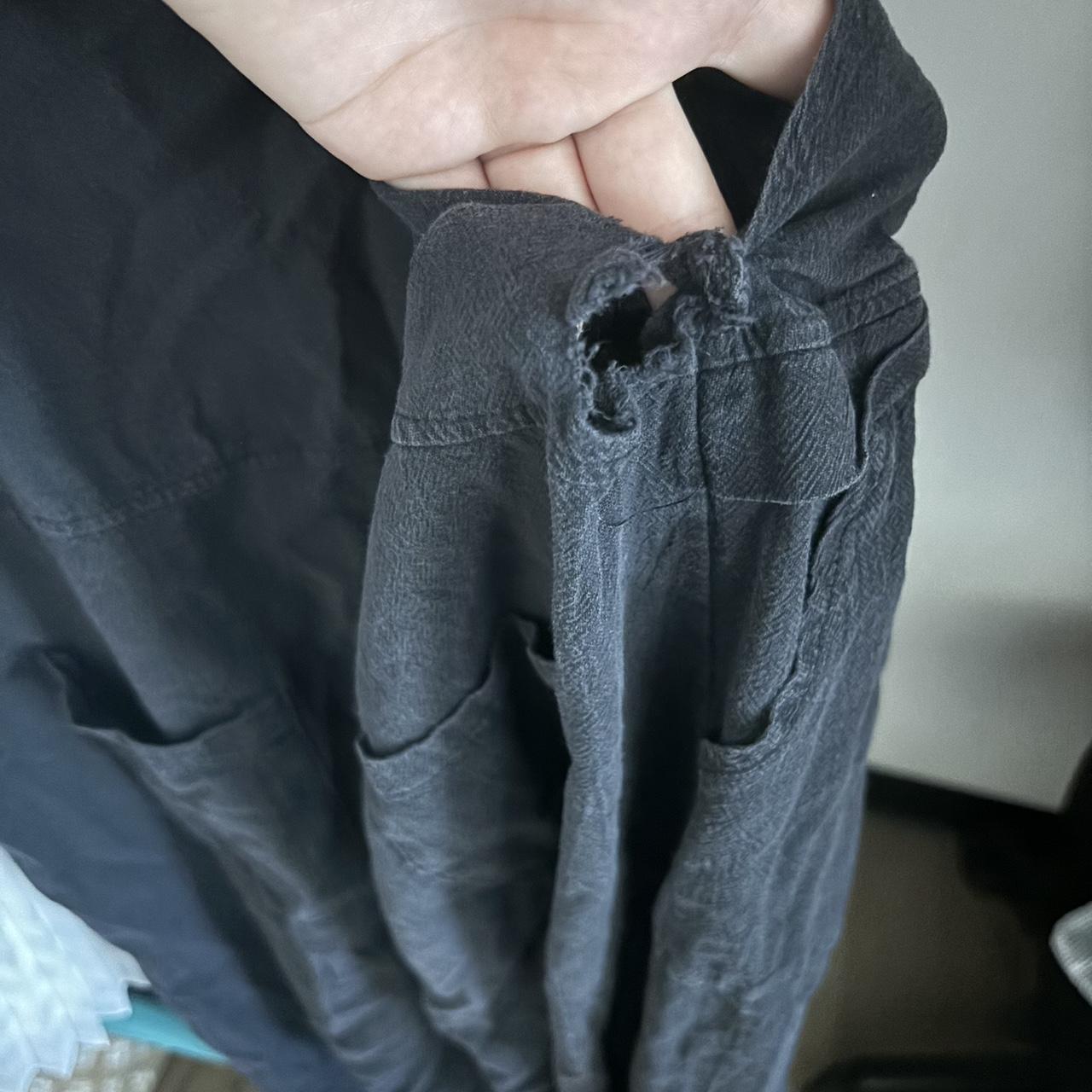 black overalls with adjustable ties. tear on left... - Depop