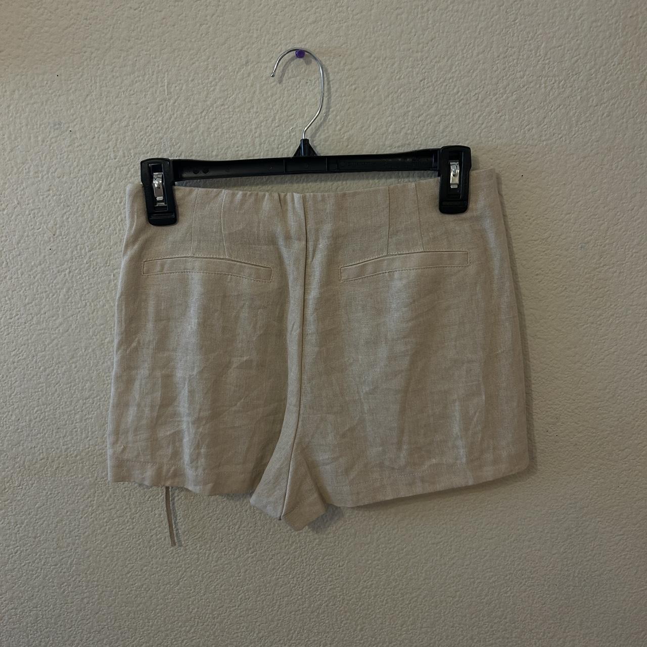 Cream linen wrap around skort with tie detail... | Depop